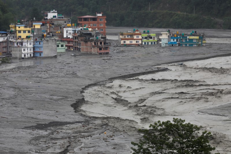 Flash floods kill 10 people in Bhutan, seven missing in Nepal | Reuters