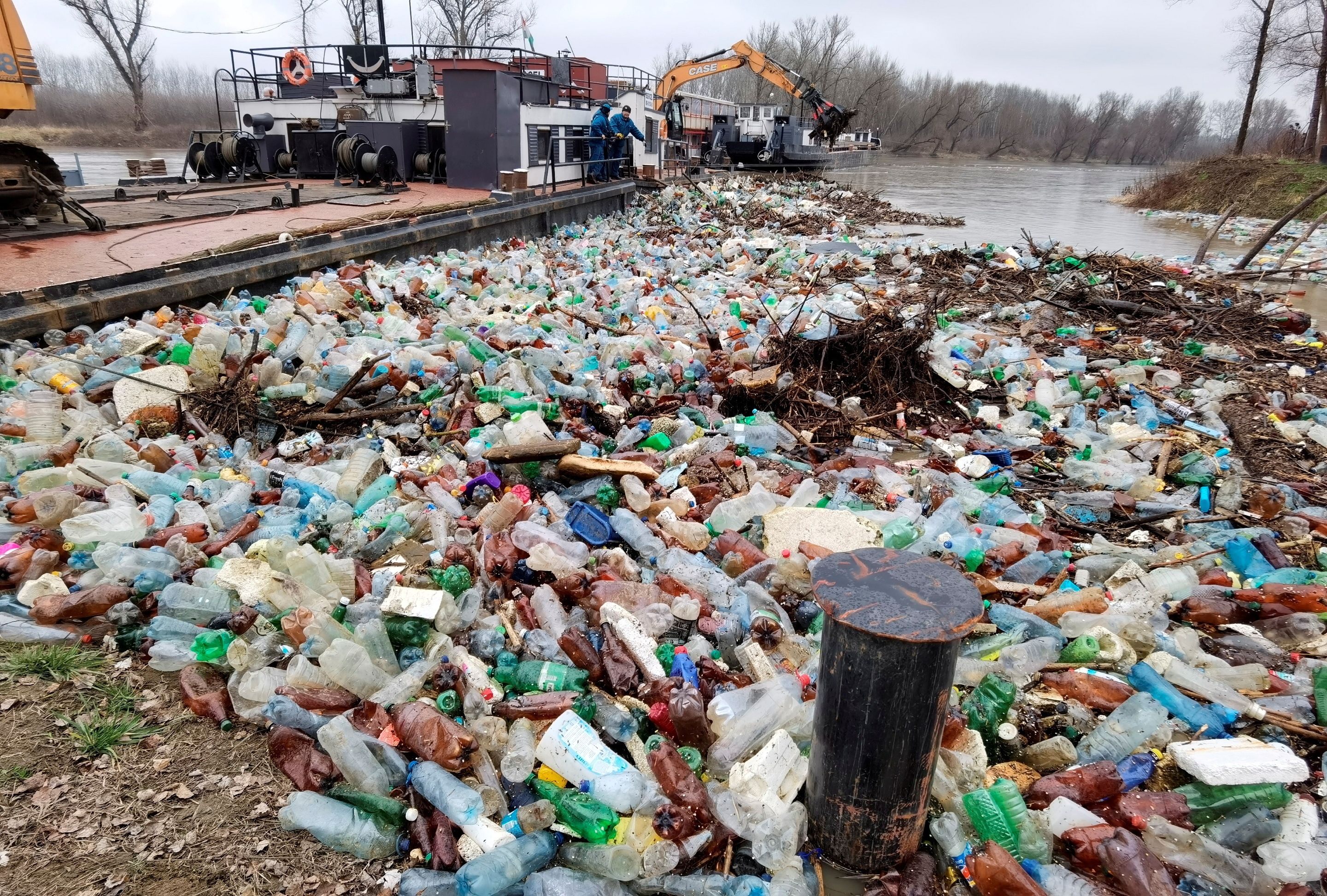 Floods send carpets of plastic waste down river to Hungary | Reuters