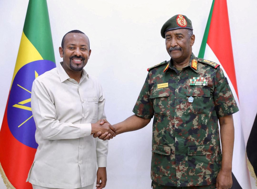 Ethiopia's Abiy visits Sudan's army chief on Red Sea coast | Reuters