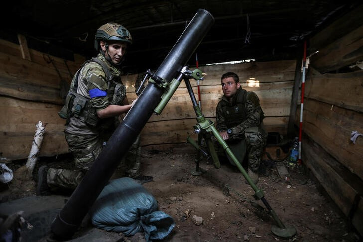 Ukraine says it retakes more ground as Zelenskiy visits front lines ...