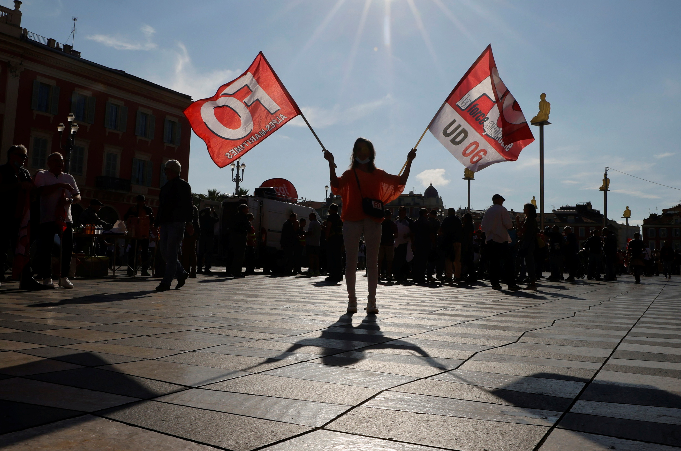 French unions march for better pay as cost of living spikes | Reuters