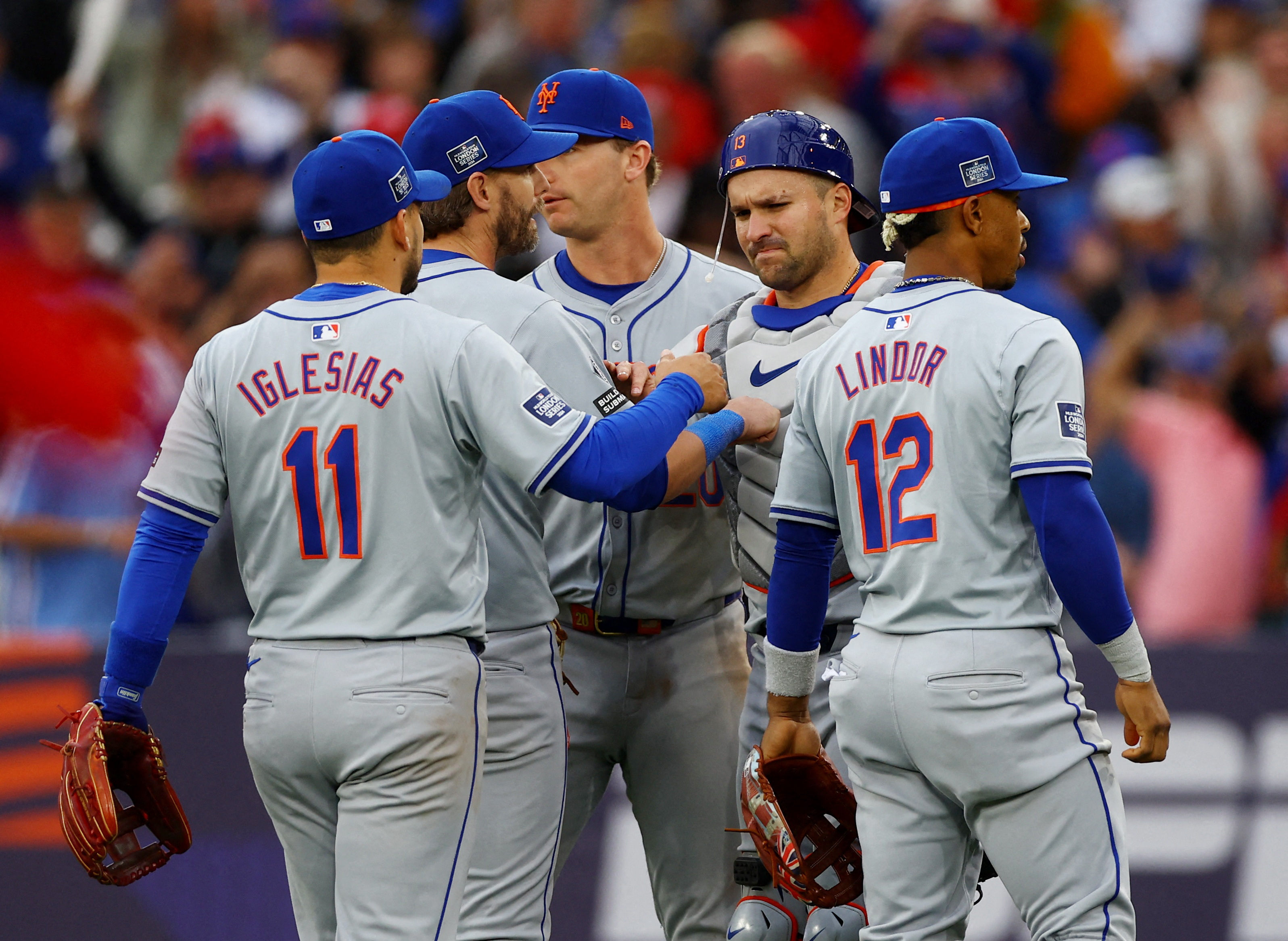 Mets rally late to beat Phillies, split London series | Reuters