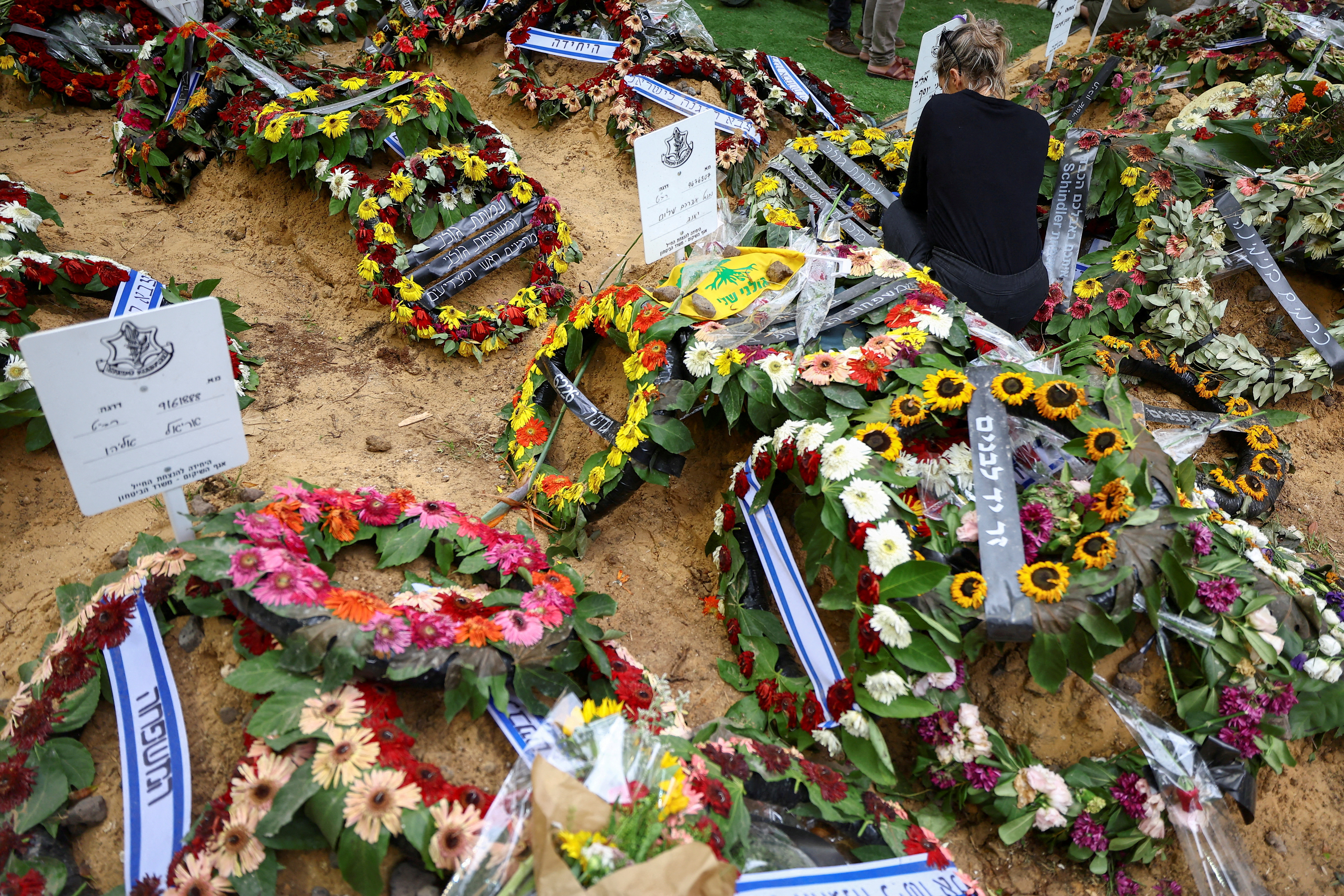 Funerals in Israel and Gaza as deaths climb - October 24, 2023 | Reuters