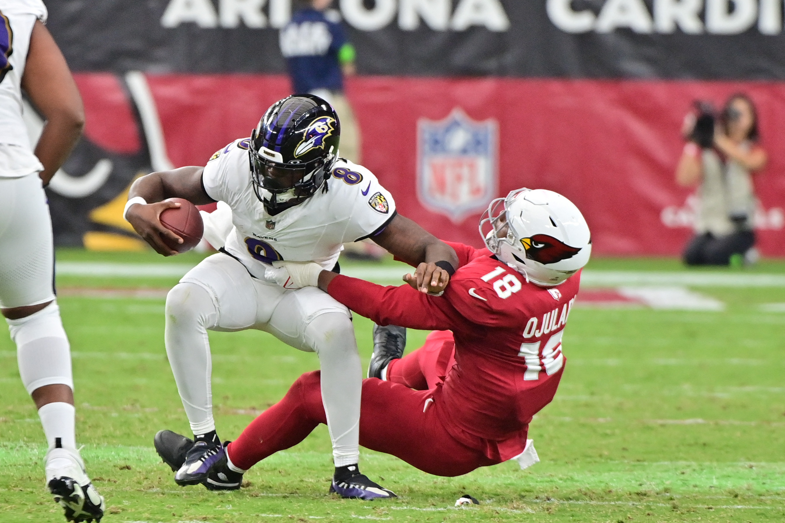 Gus Edwards racks up 3 TDs as Ravens fend off Cardinals | Reuters