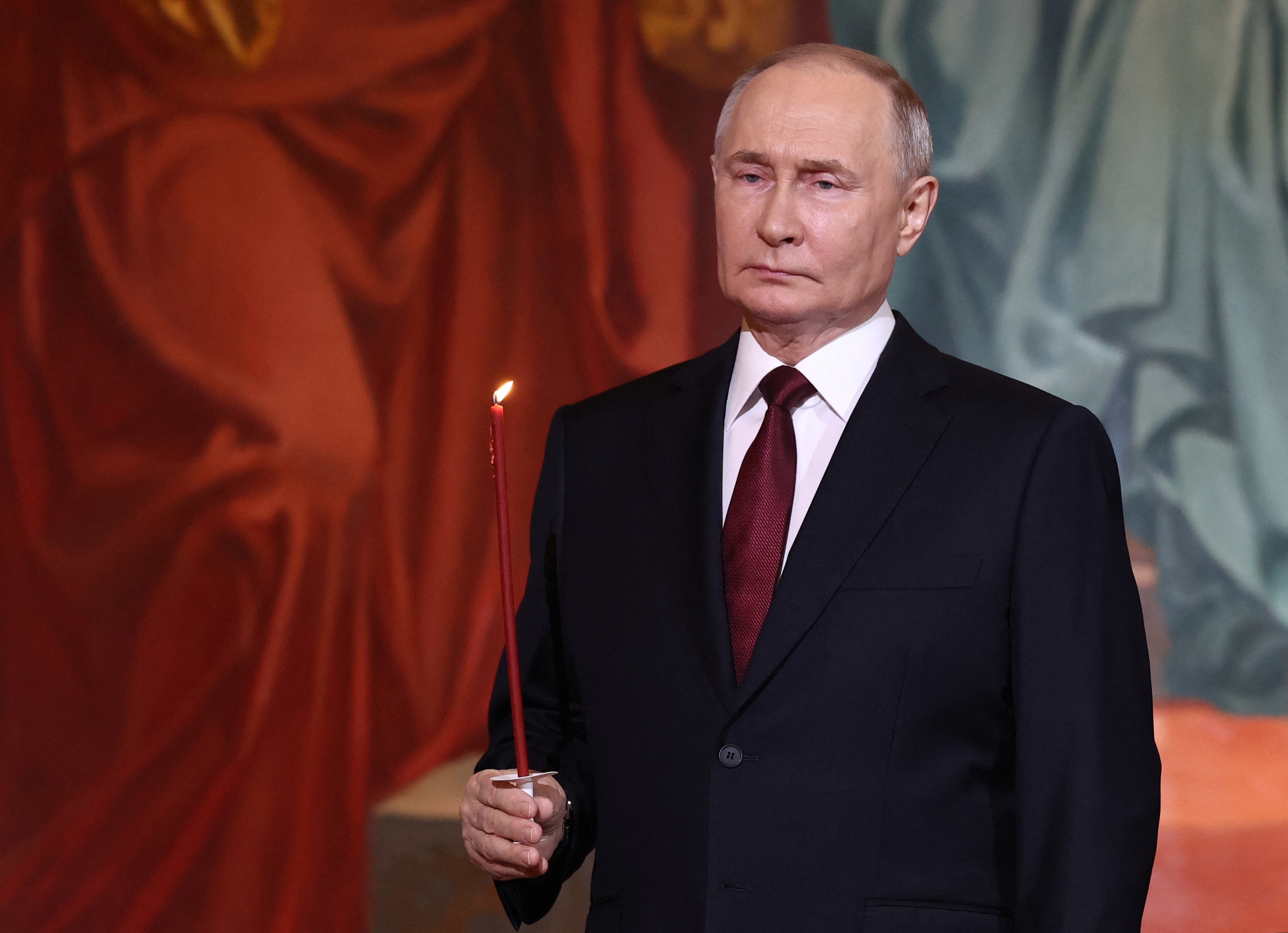 Putin attends Easter service led by head of Russia's Orthodox Church ...
