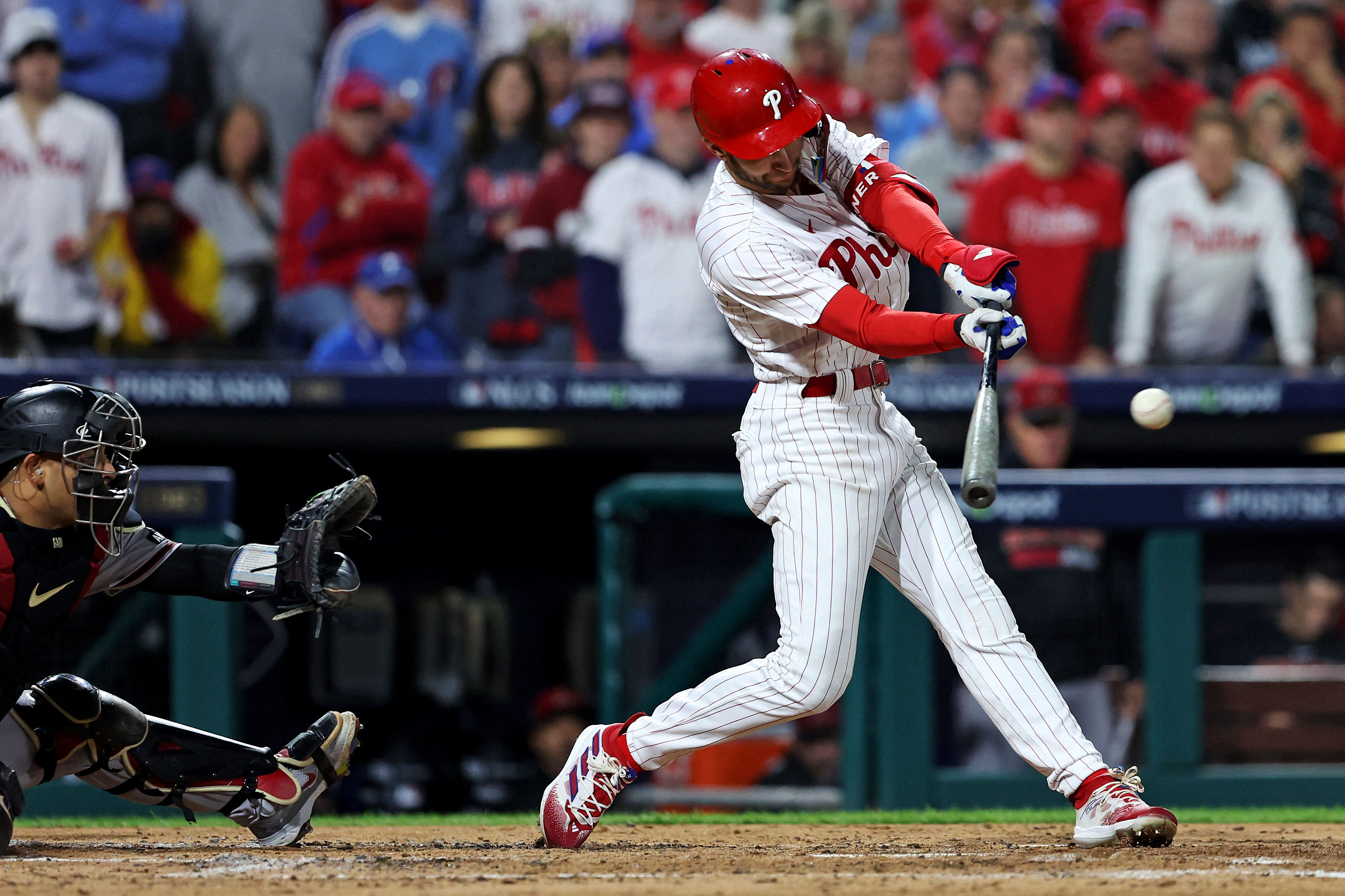 Early homers propel Phils past D-backs in NLCS opener | Reuters