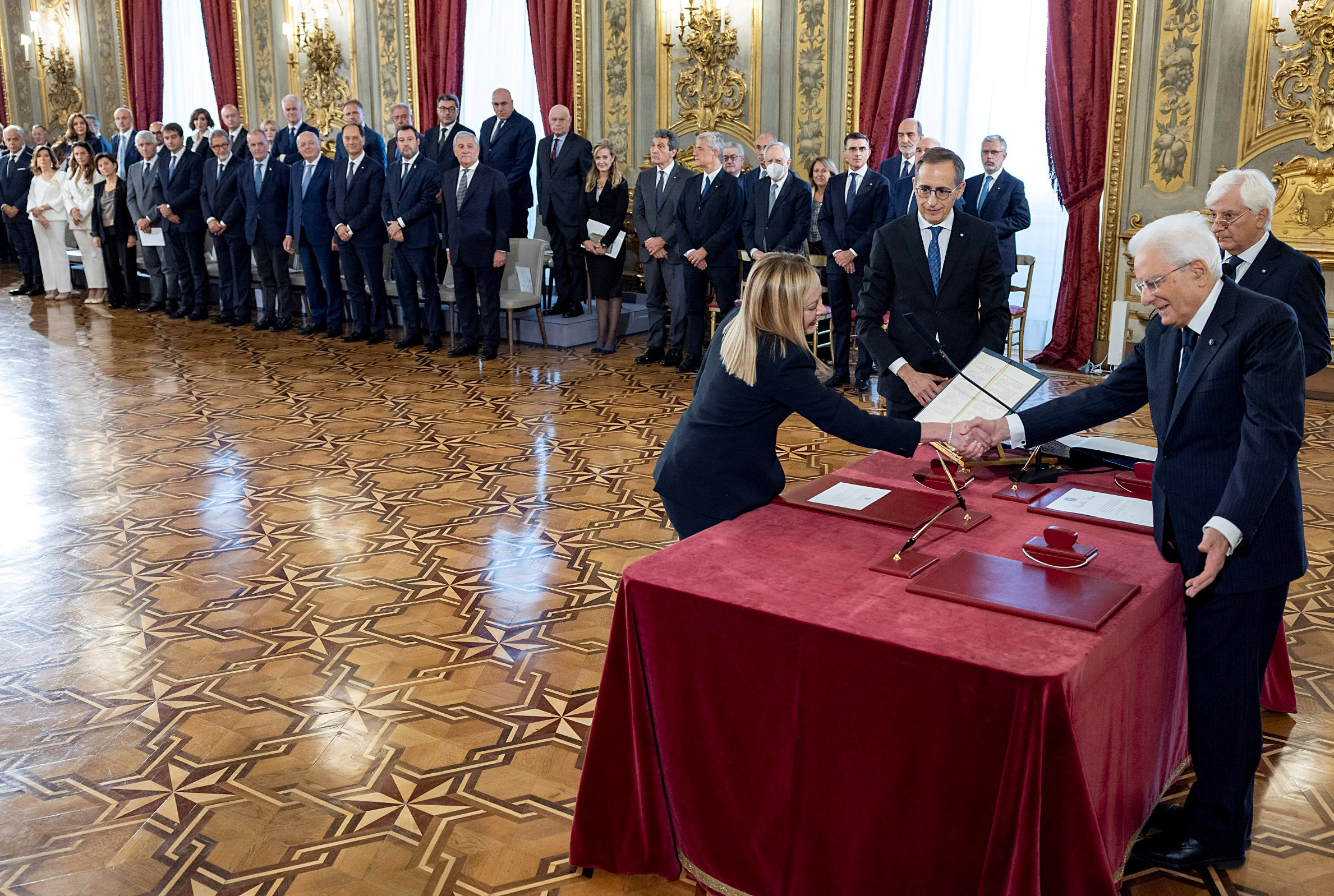Right-wing Meloni sworn in as Italy's first woman prime minister | Reuters