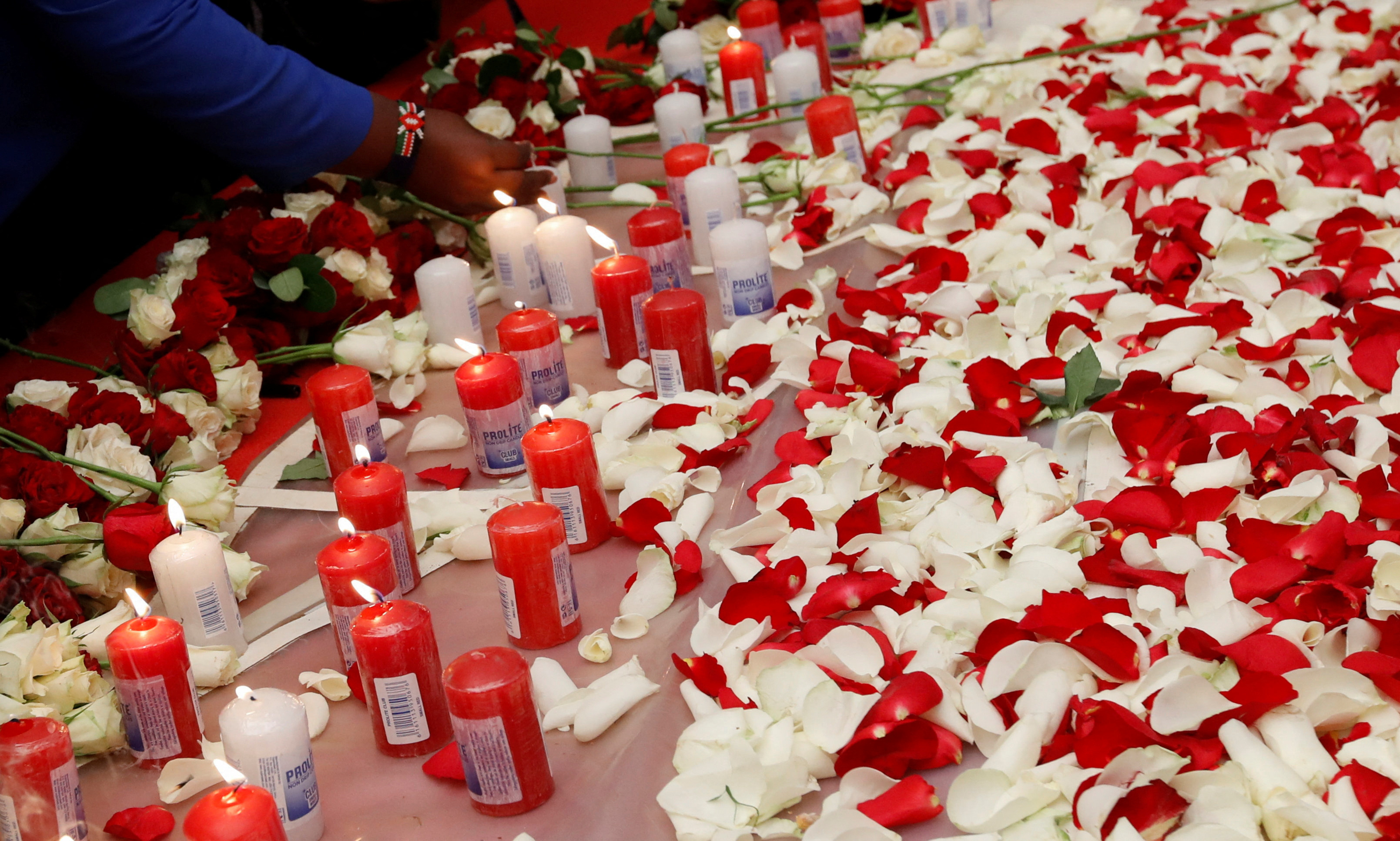 Kenya's opposition holds vigils for slain and injured protesters | Reuters