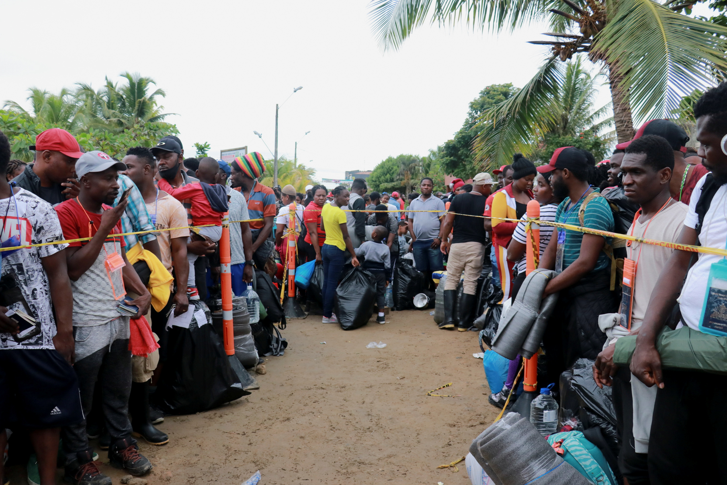 For migrants bound for U.S., a long wait in a Colombian beach town ...