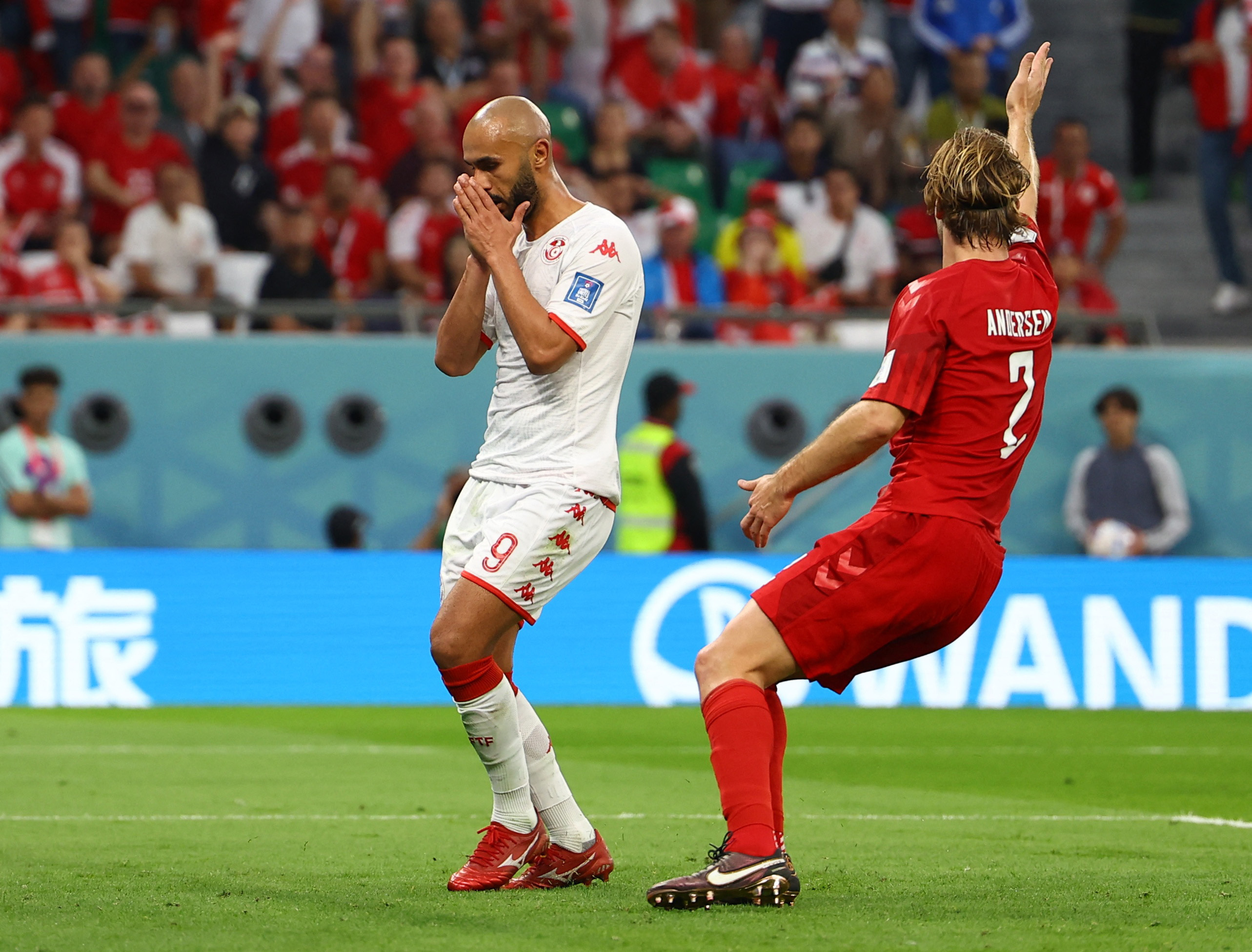 Crowd gives Tunisia lift as they hold Denmark 0-0 at halftime | Reuters