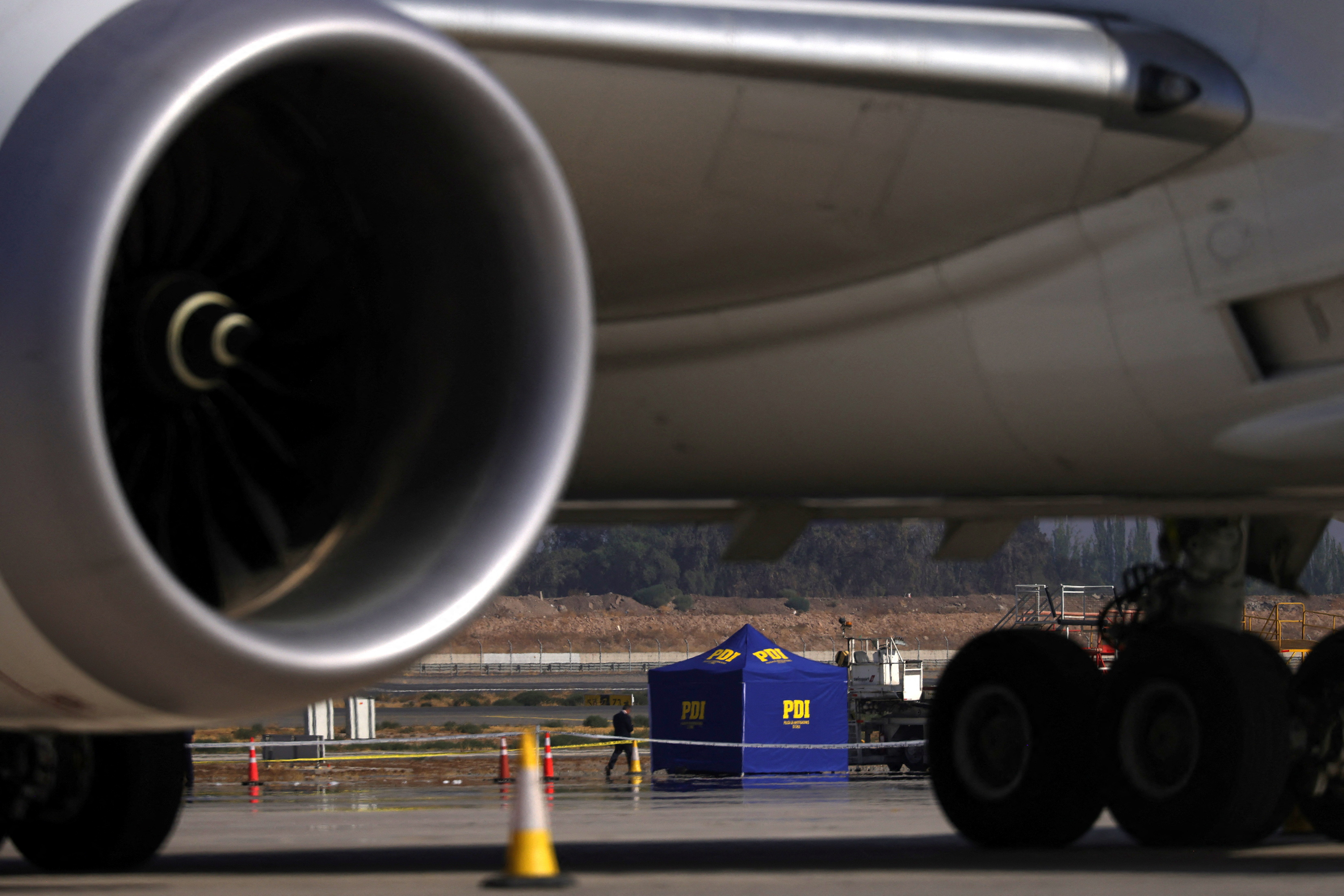 Foiled multimillion dollar airport heist leaves two dead in Chile | Reuters