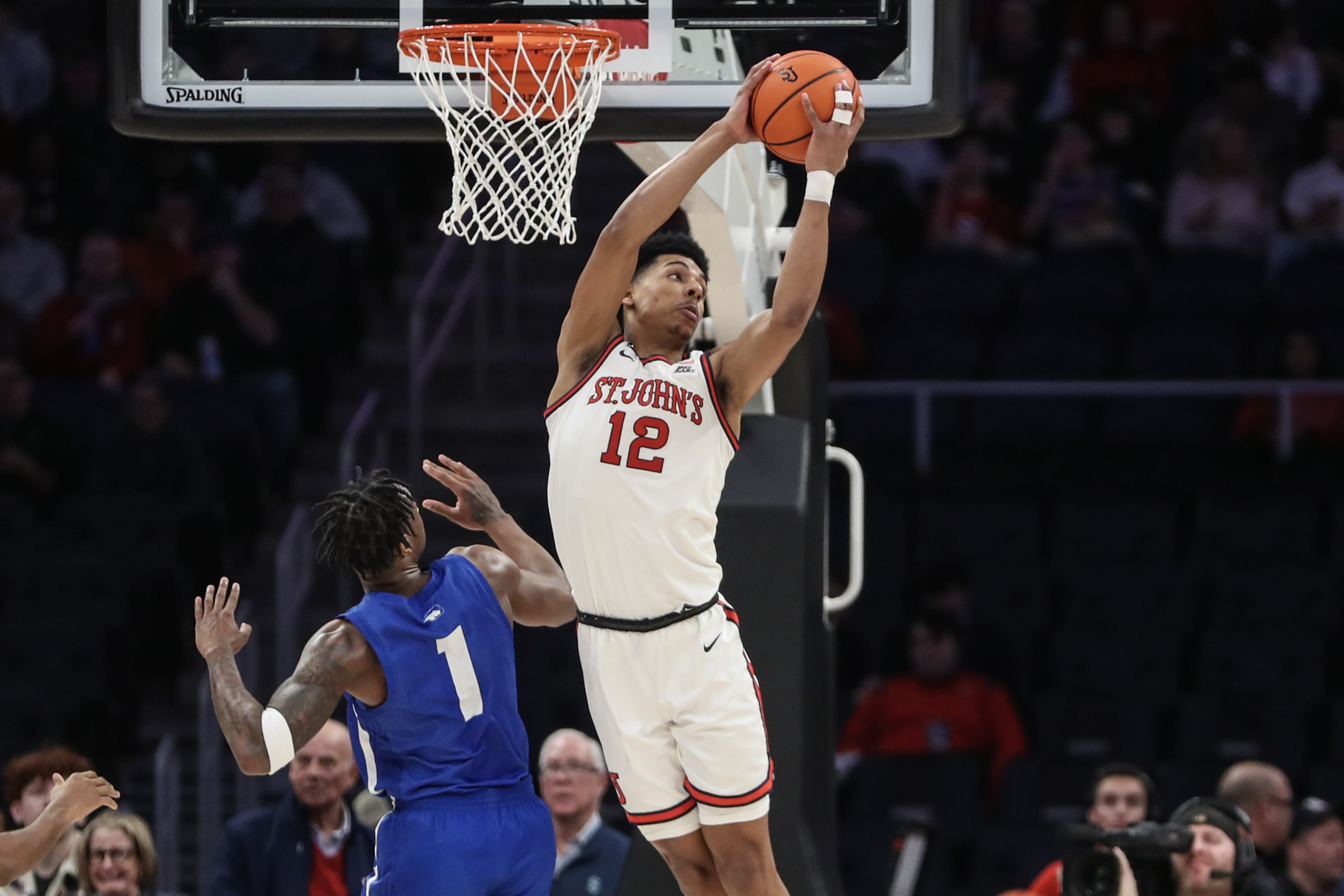 Daniss Jenkins helps St. John's hold off Hofstra down stretch | Reuters