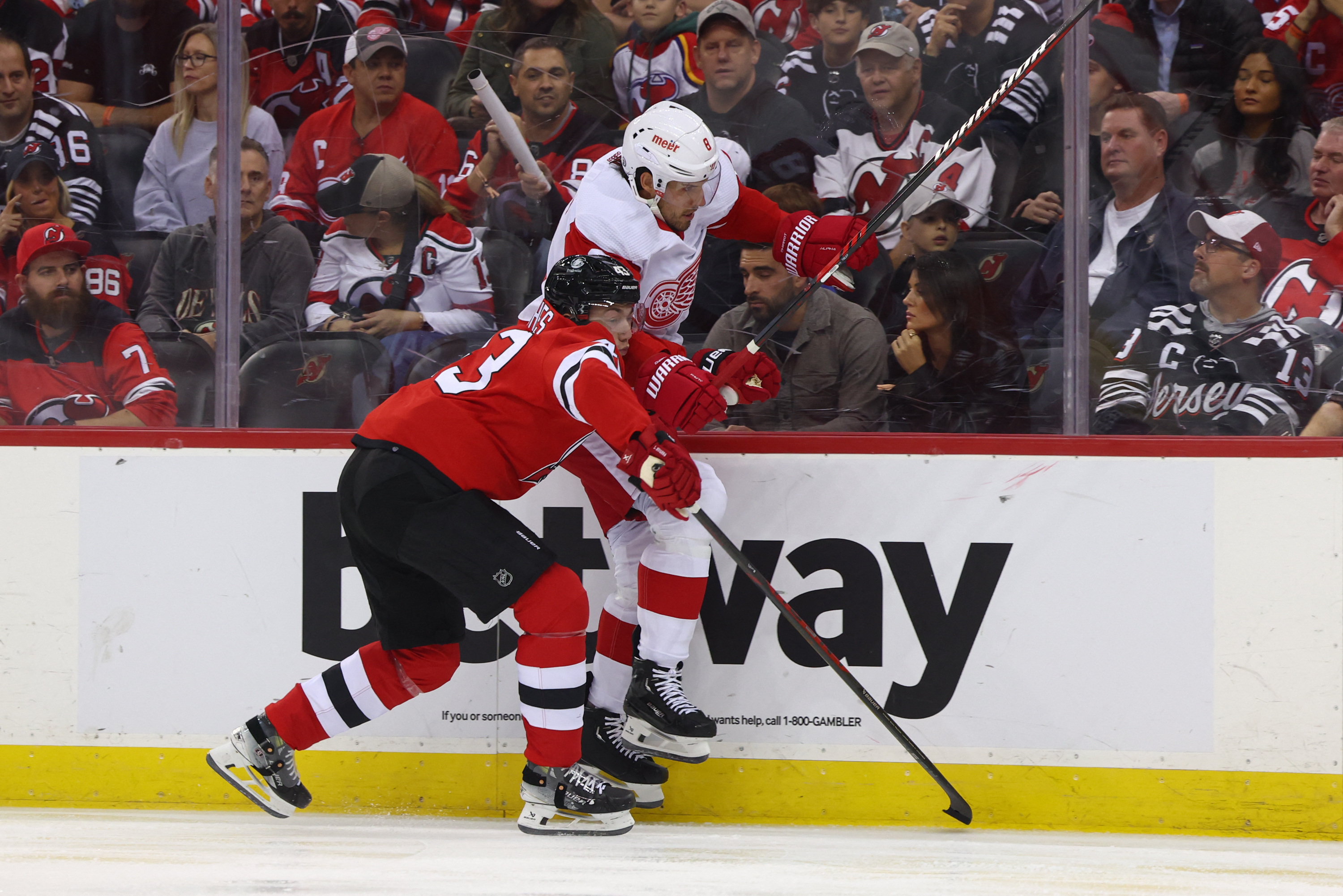 Jack Hughes tallies twice as Devils hold off Red Wings | Reuters