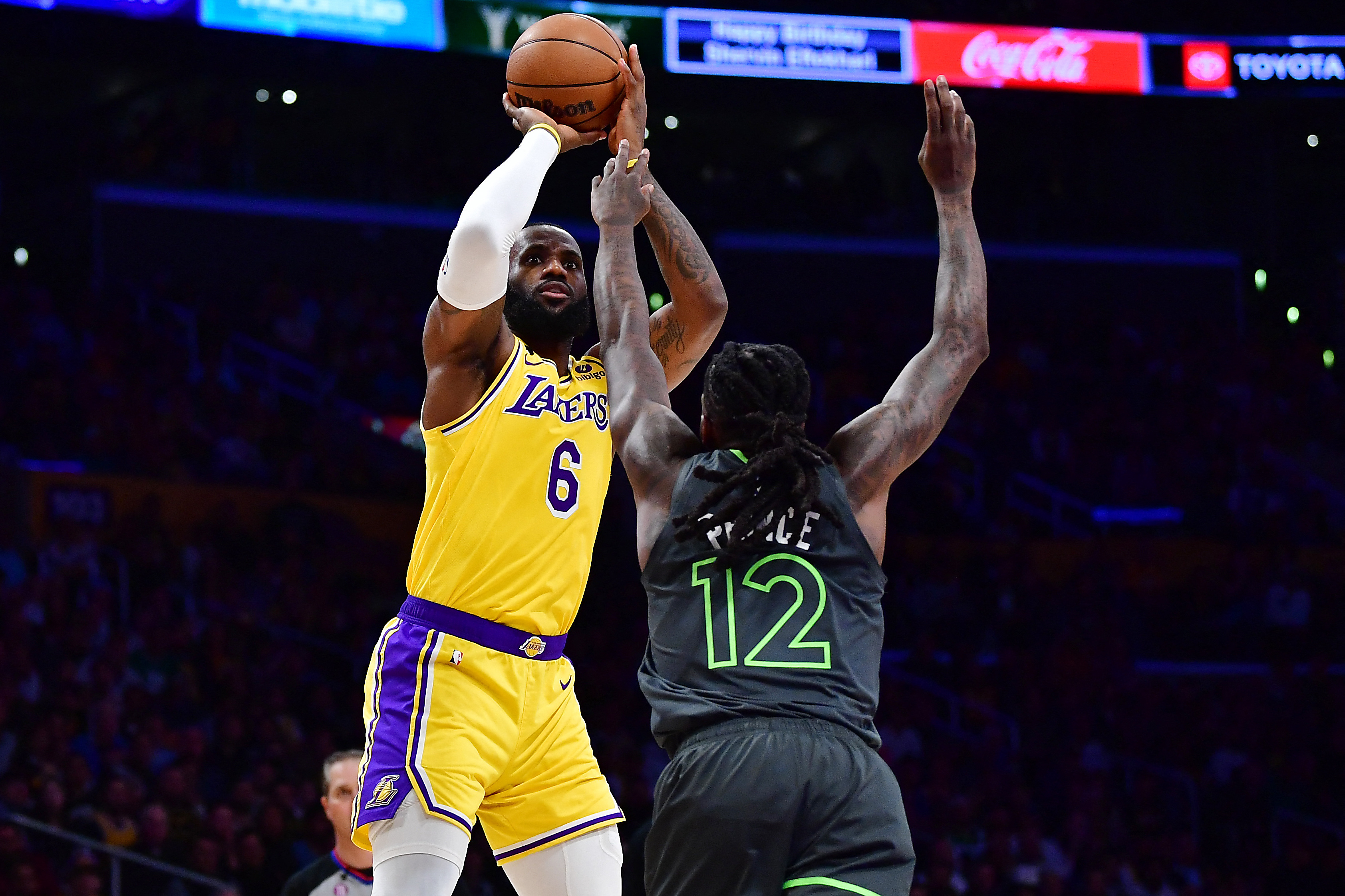 Lakers slip past Wolves in OT, grab West's No. 7 seed | Reuters