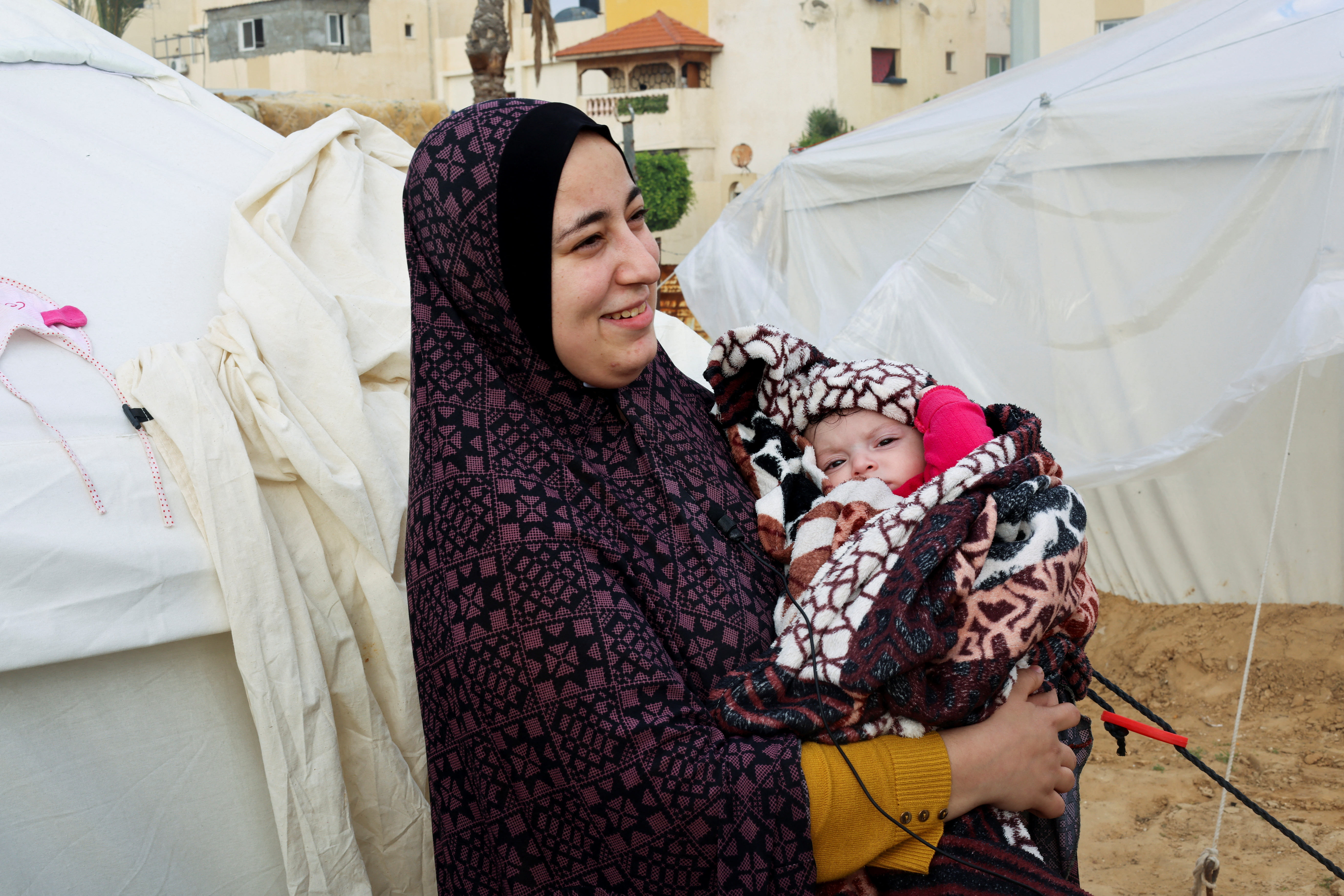 Unwashed and underfed, babies born into Gaza war face hardship in tents ...