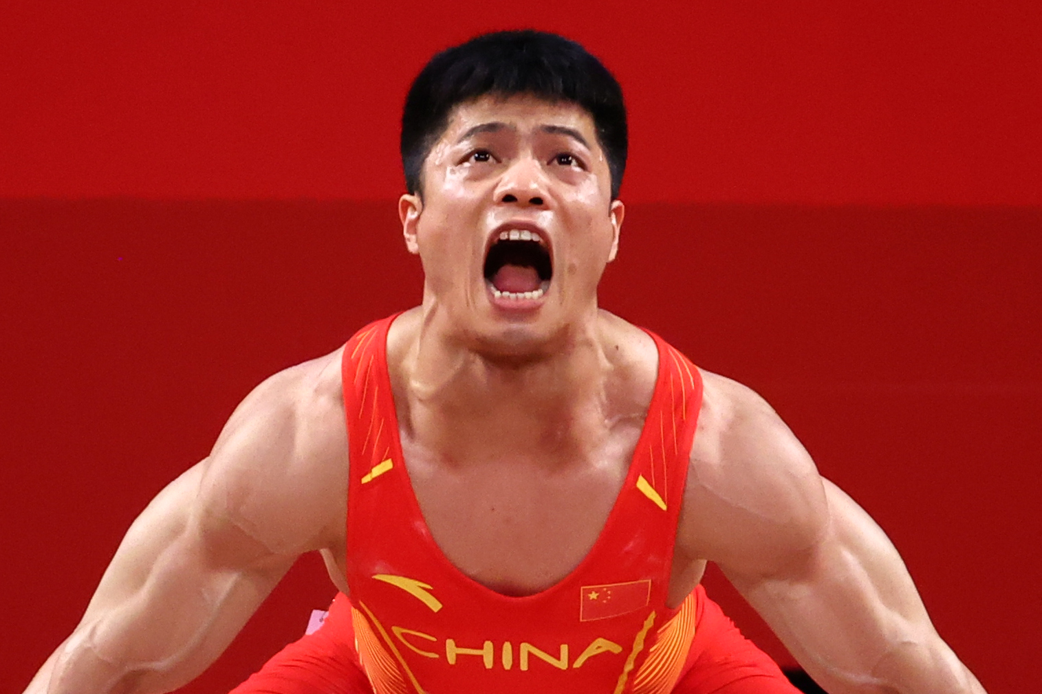 Weightlifting-China's Li wins gold in men's 61kg | Reuters