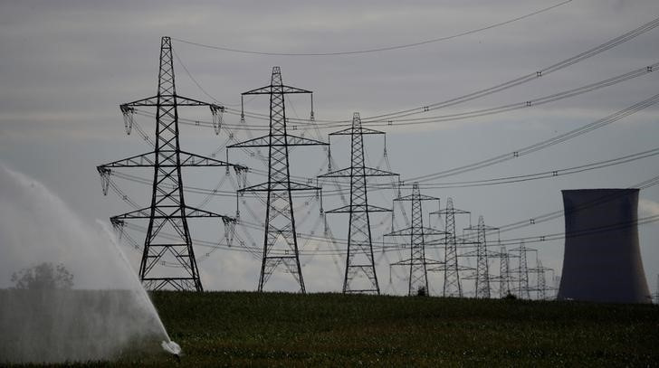 Britain to speed up grid connection for new power projects | Reuters