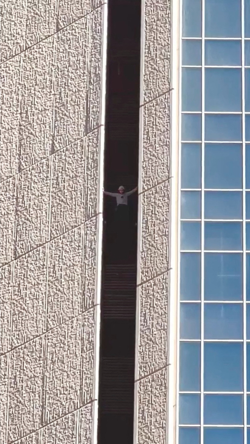 Anti-abortion activist climbs Arizona's tallest building | Reuters