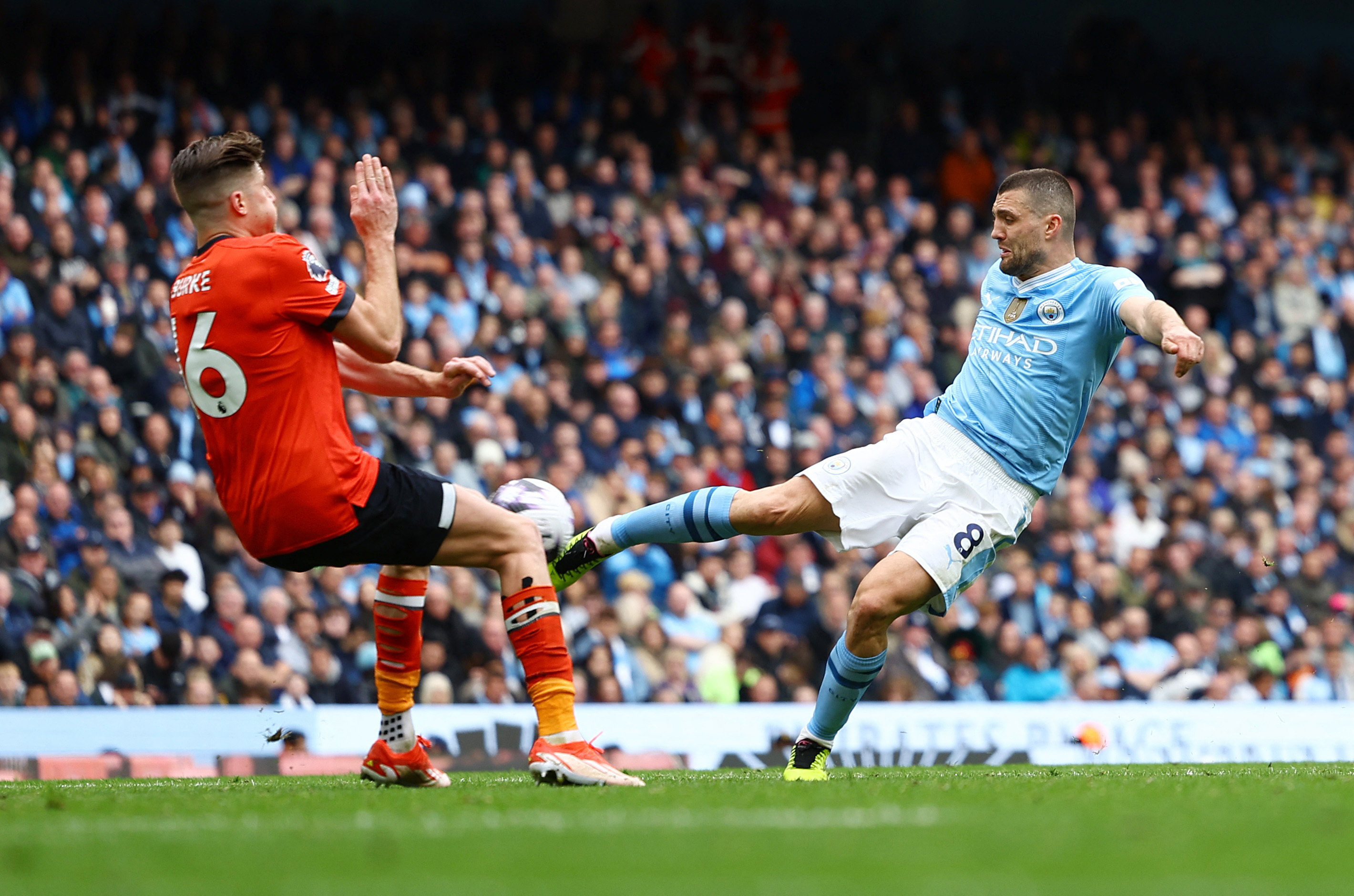 Man City go top after thrashing Luton, Spurs crash | Reuters