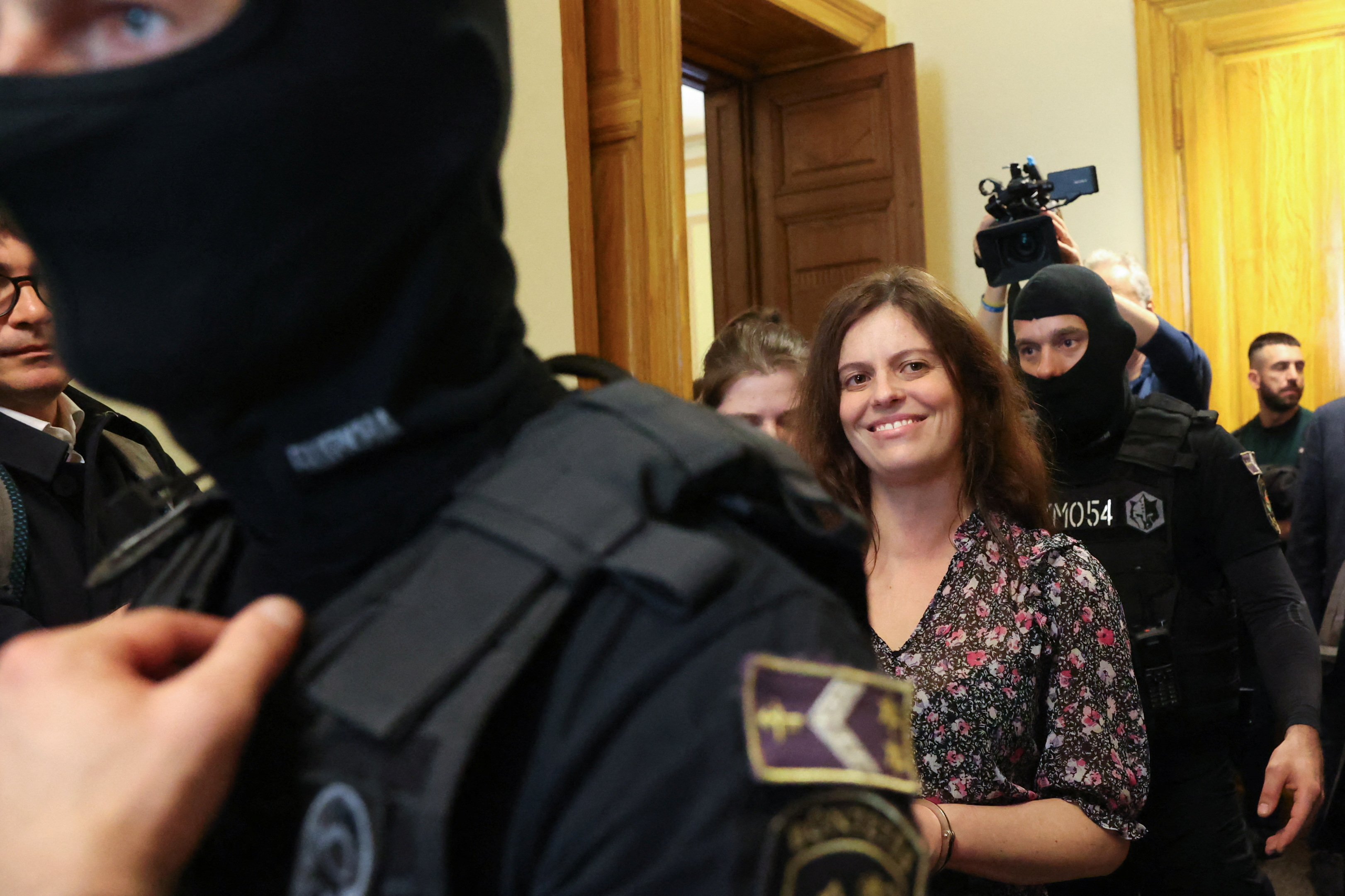 Italian woman held in Hungary to remain in jail | Reuters