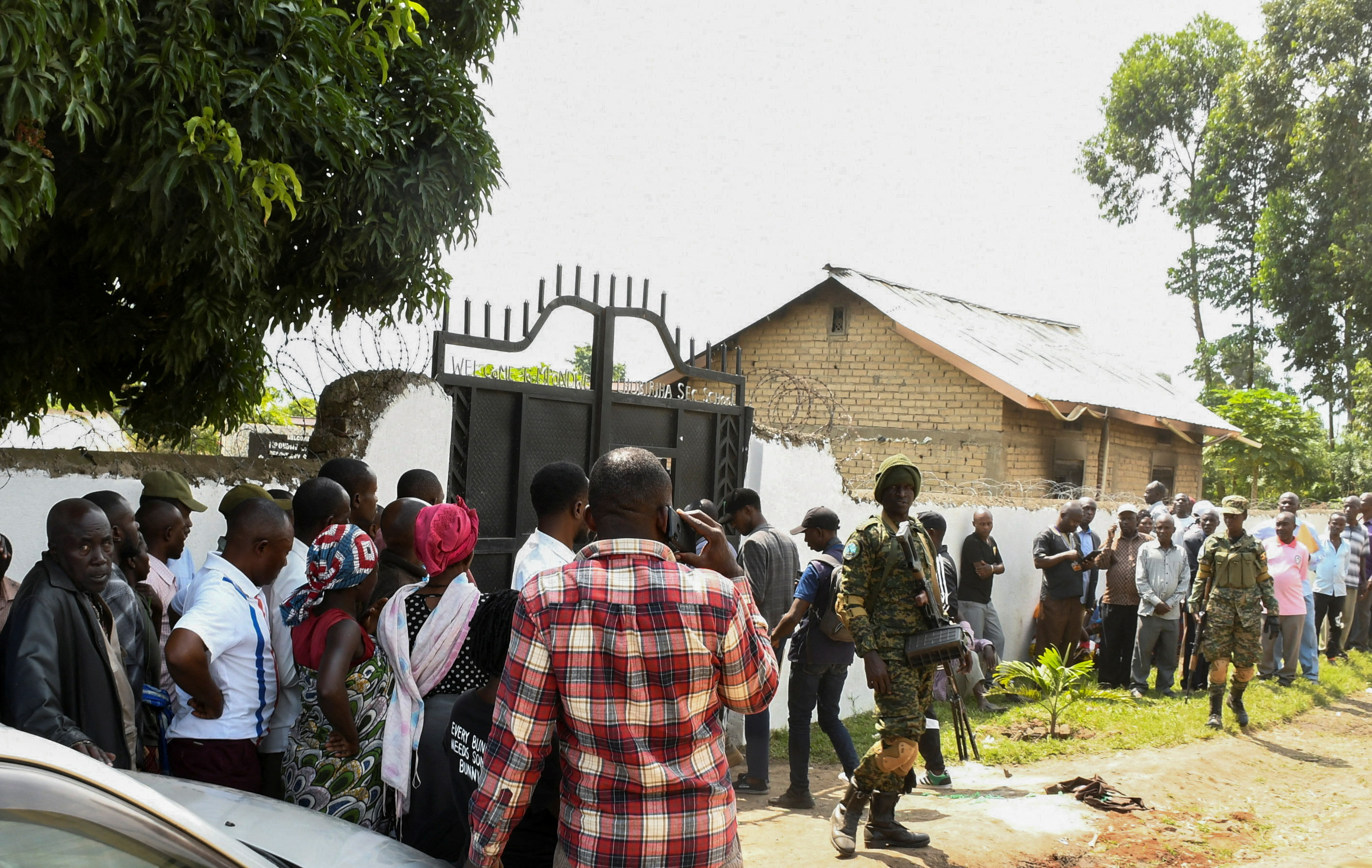 Uganda sends more troops to pursue attackers who killed 37 students ...