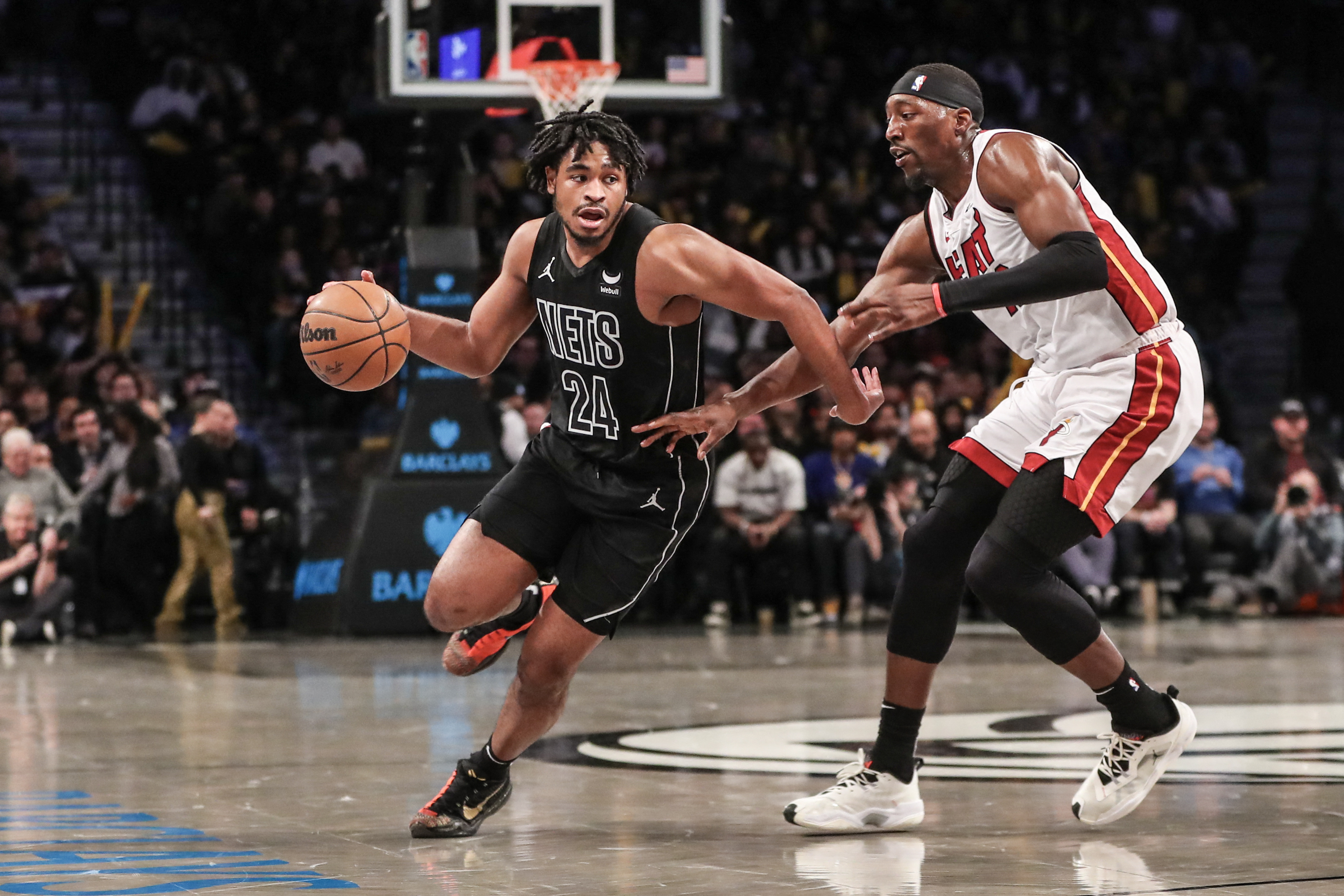 Jimmy Butler returns to guide Heat past Nets in OT | Reuters