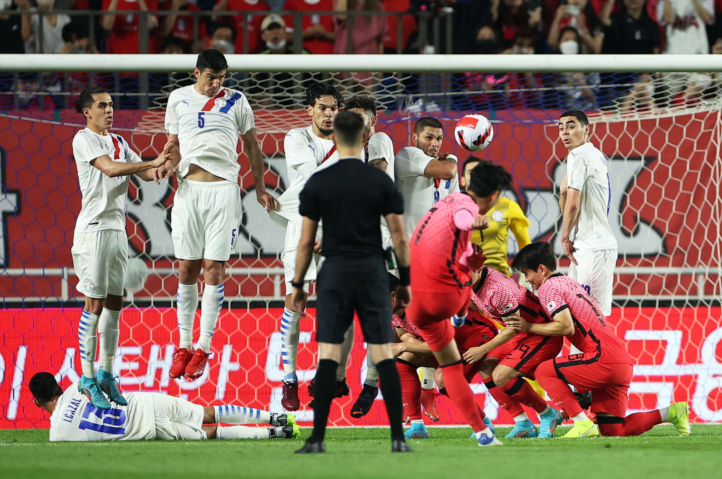 South Korea fight back to earn draw after Almiron double | Reuters