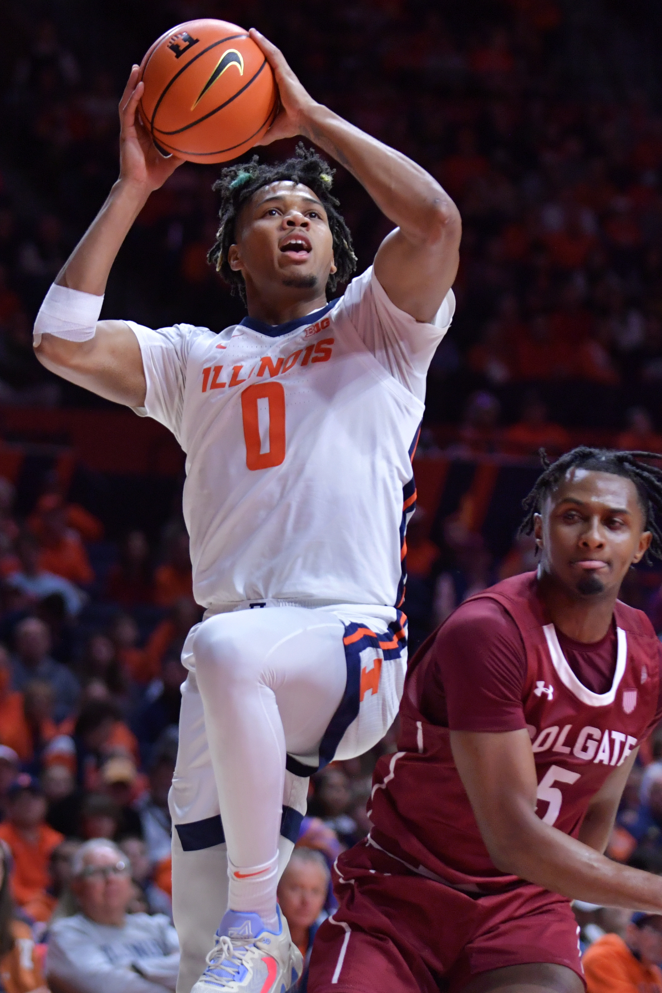 Coleman Hawkins, No. 16 Illinois take care of Colgate | Reuters