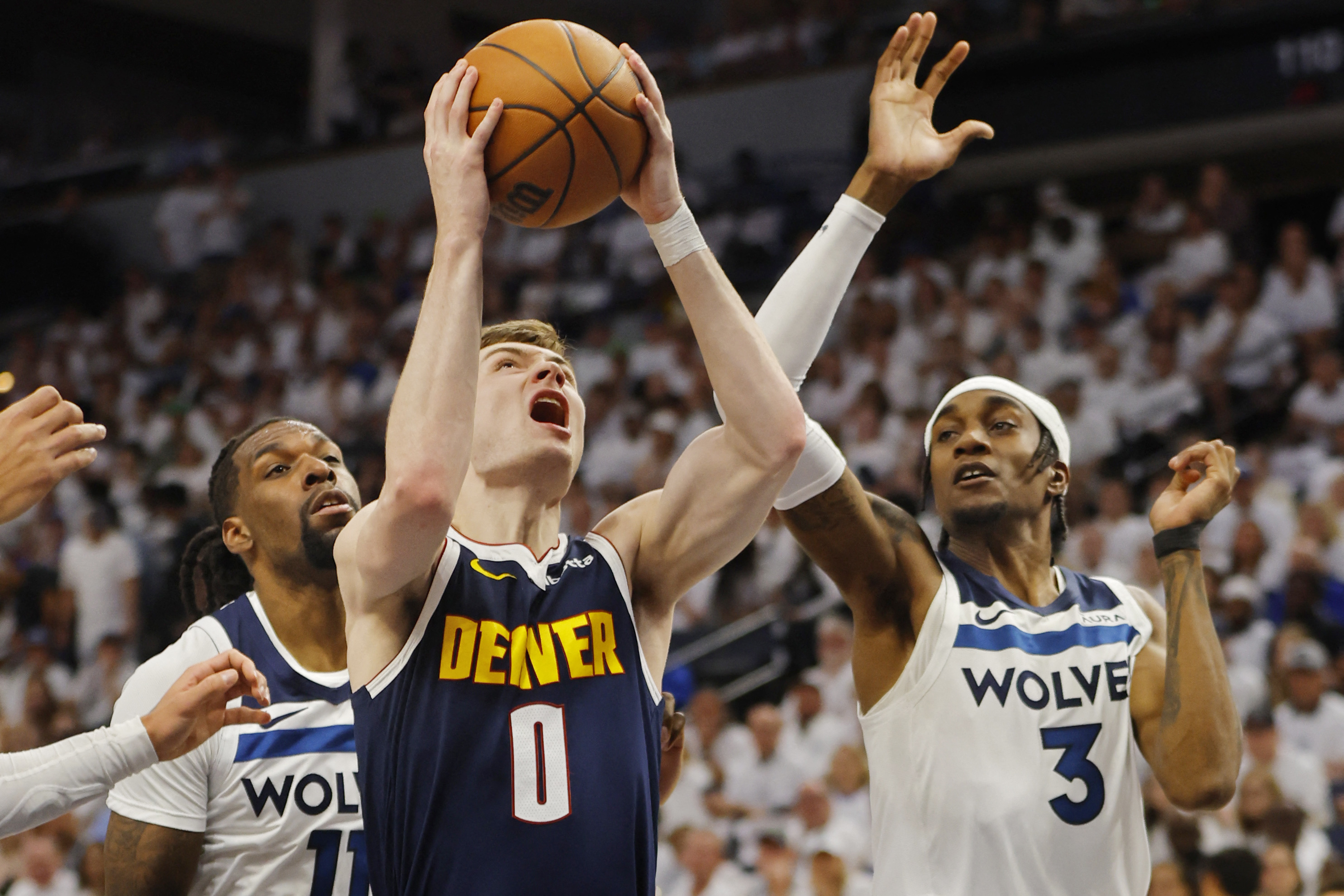 Road team wins again as Nuggets knock off Wolves, tie series | Reuters