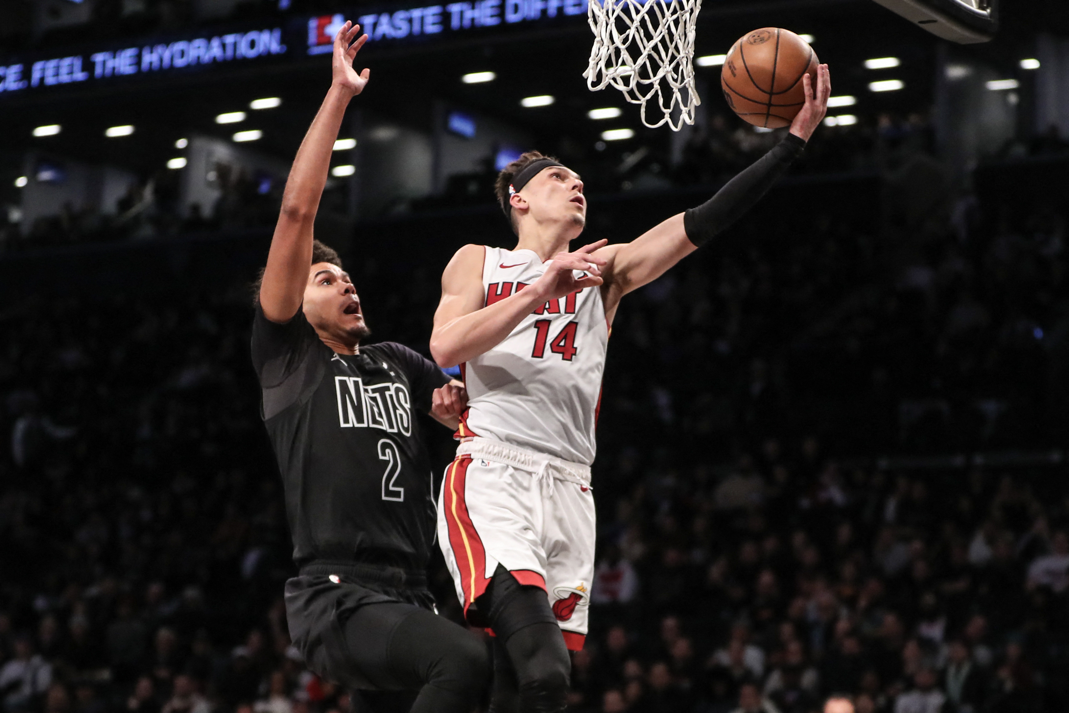 Jimmy Butler returns to guide Heat past Nets in OT | Reuters