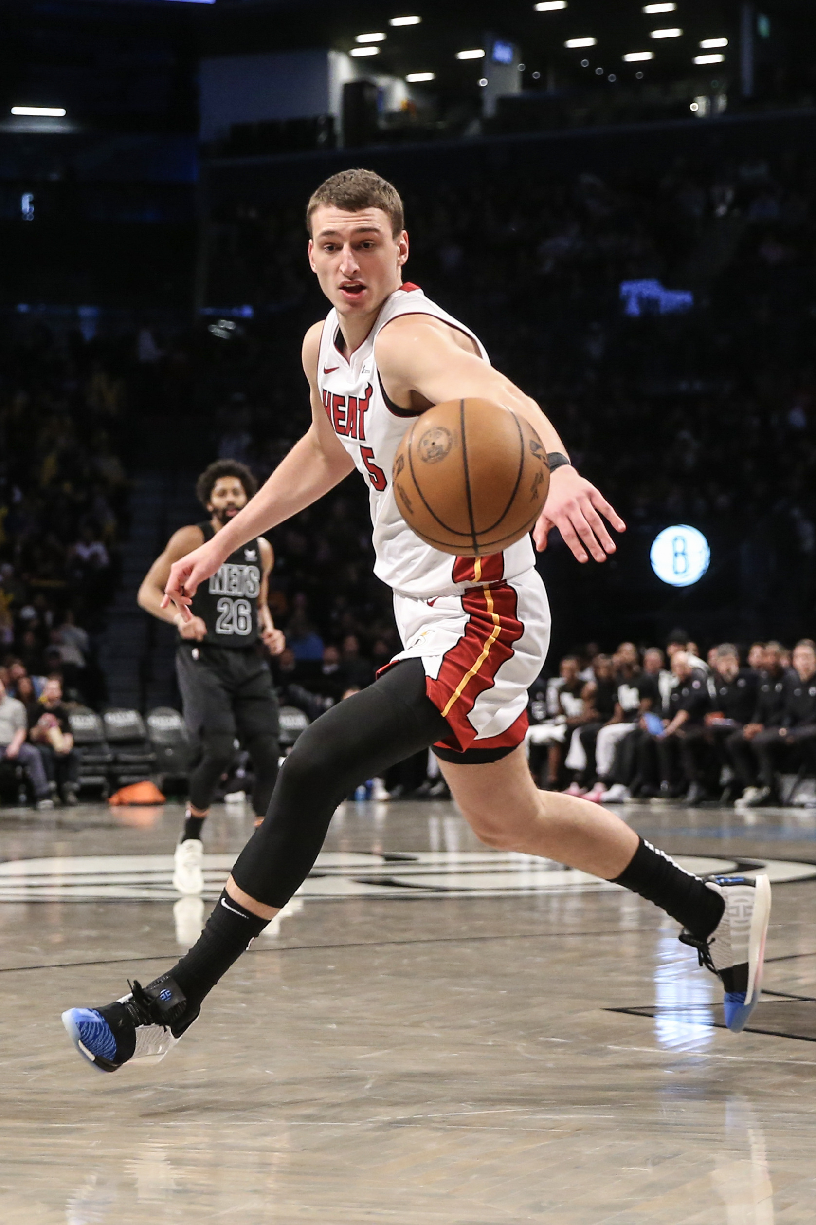 Jimmy Butler returns to guide Heat past Nets in OT | Reuters