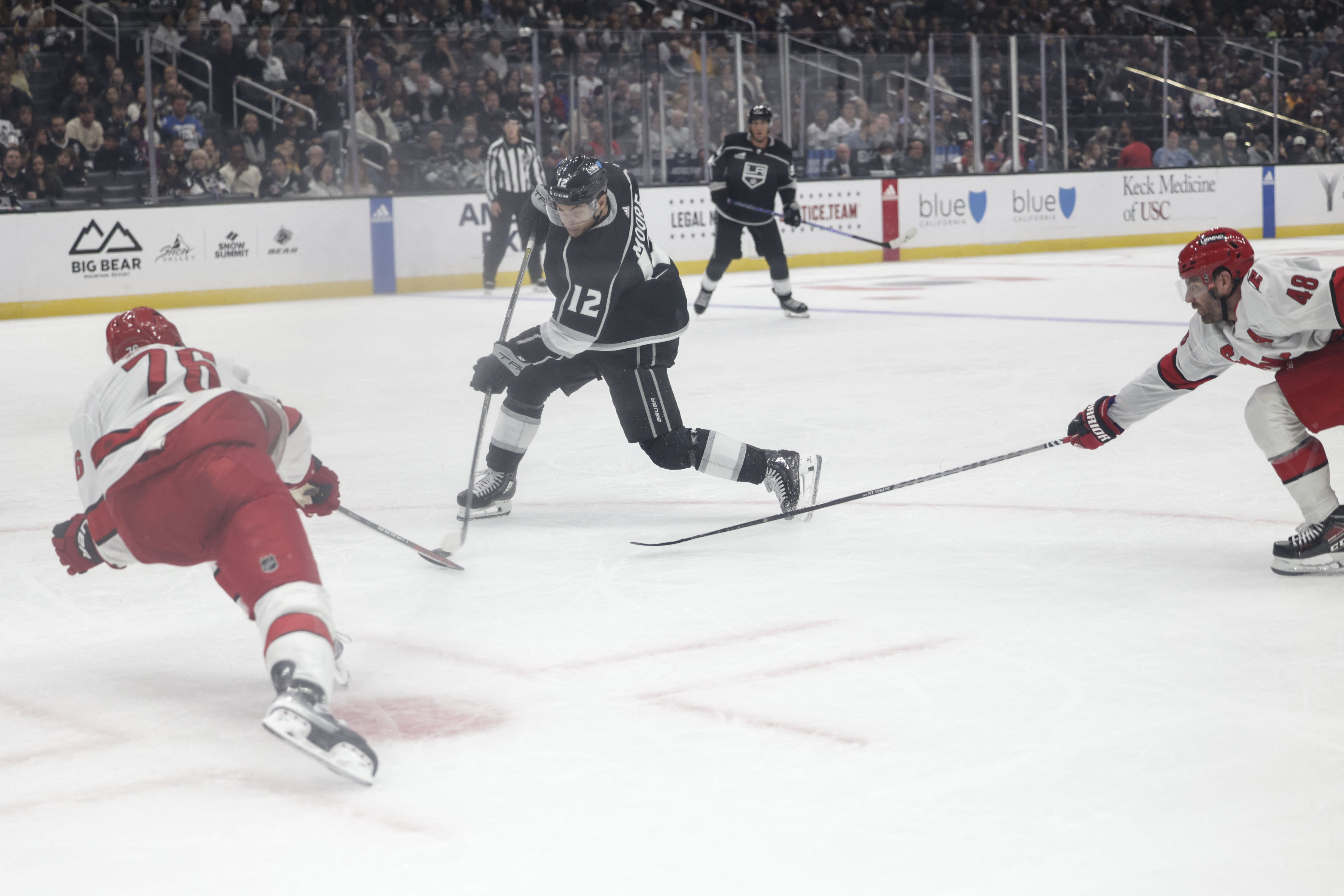 Hurricanes blow early lead, beat Kings in 9-round shootout | Reuters