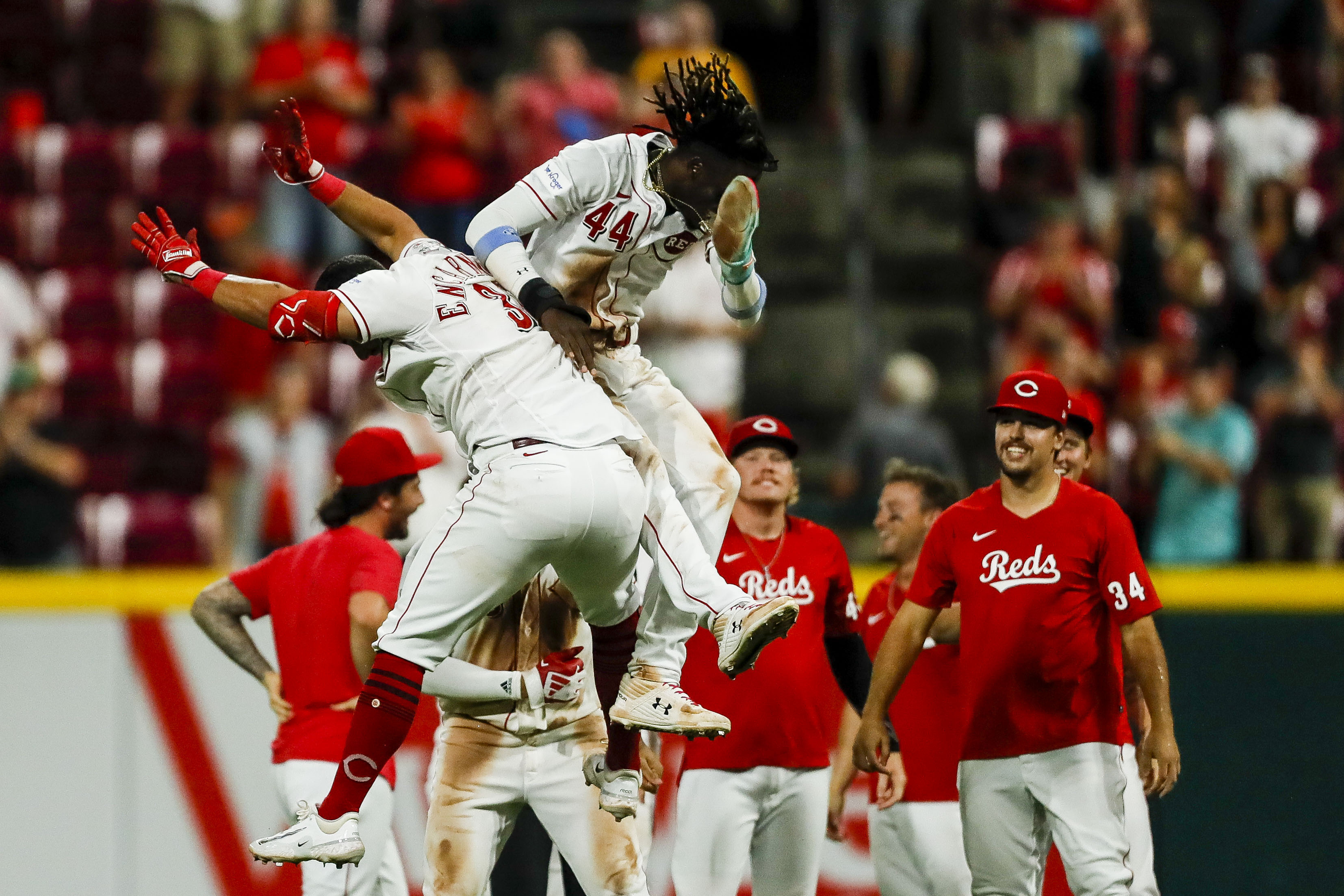 Nick Martini fuels Reds' late rally past Mariners | Reuters