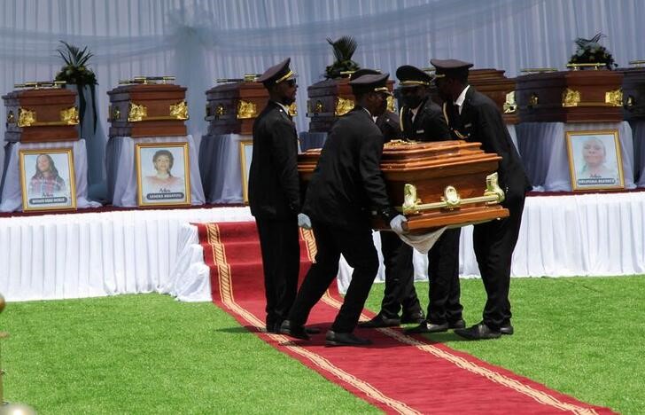 Congo bids painful farewell to victims of snapped power cable | Reuters