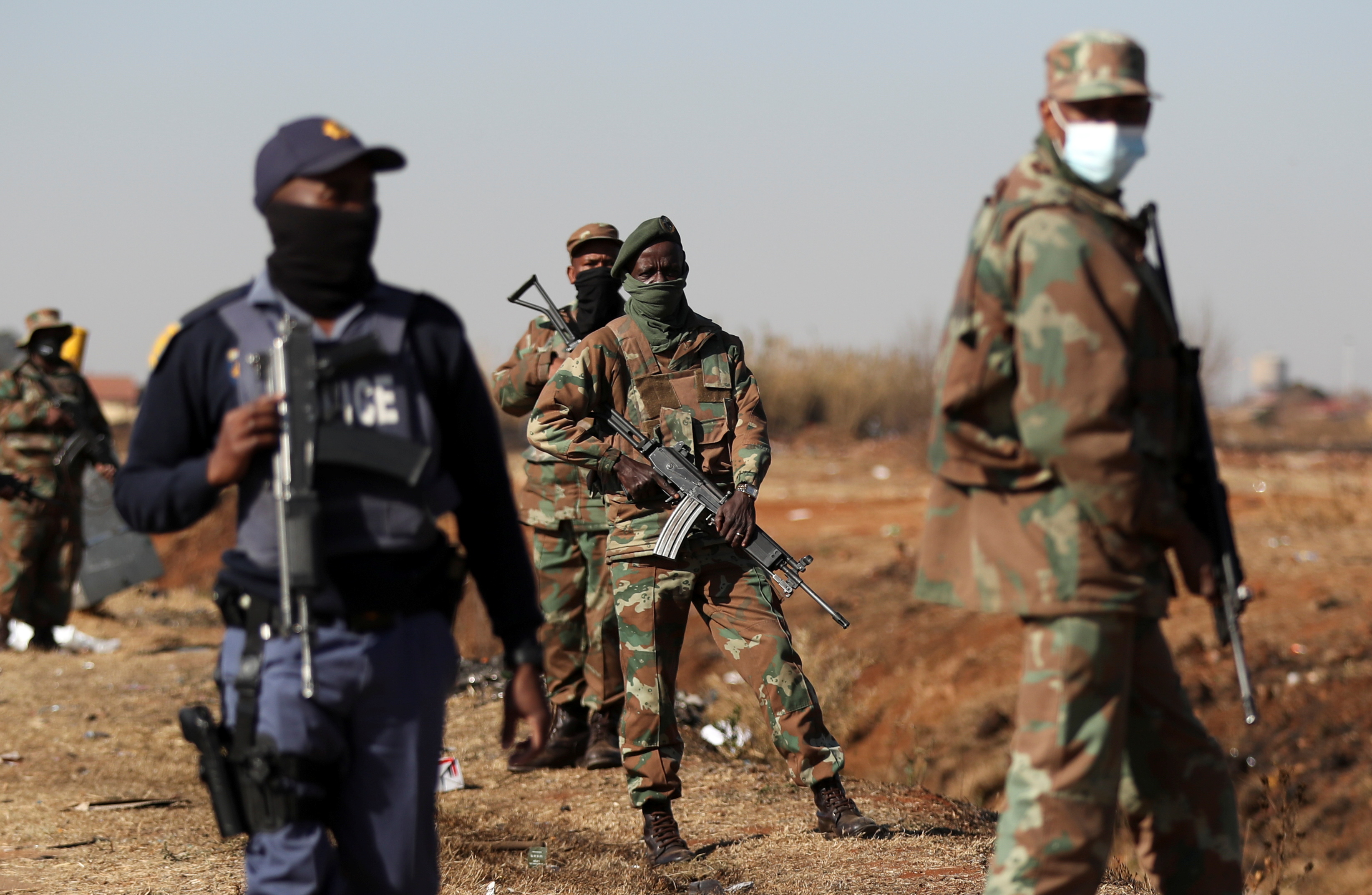 S.African govt plans troop surge to quell unrest -reports | Reuters