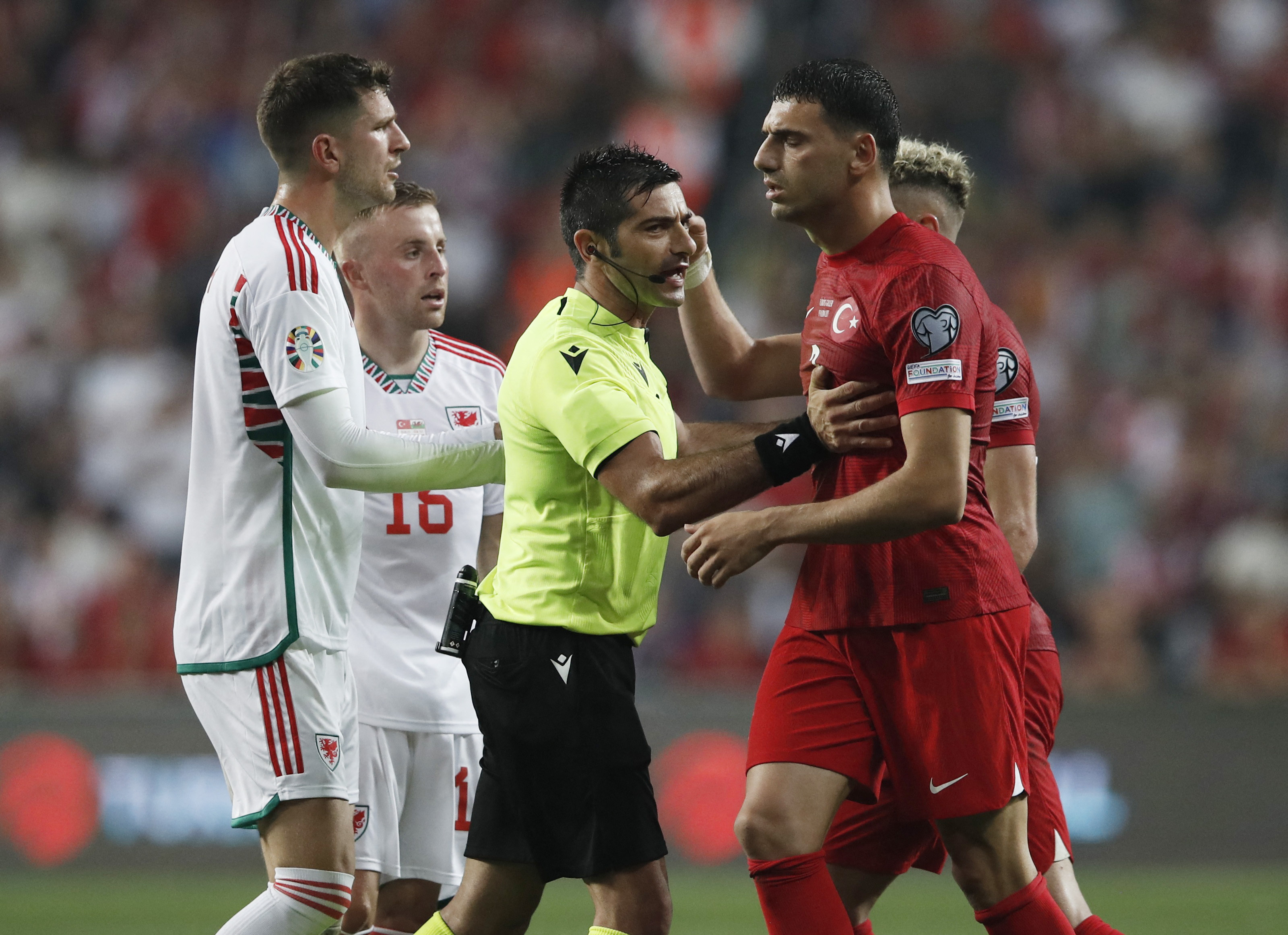 Turkey go top after beating 10-man Wales | Reuters