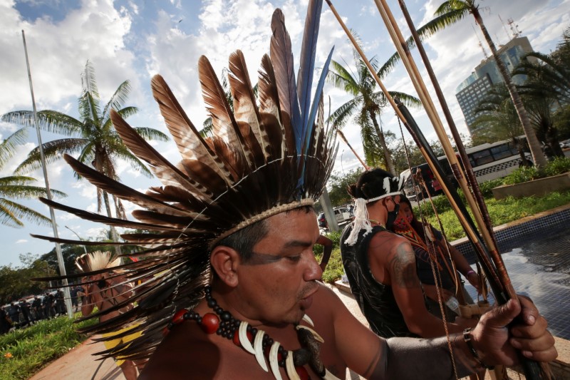 Firing arrows, indigenous people in Brazil protest bill curtailing land ...