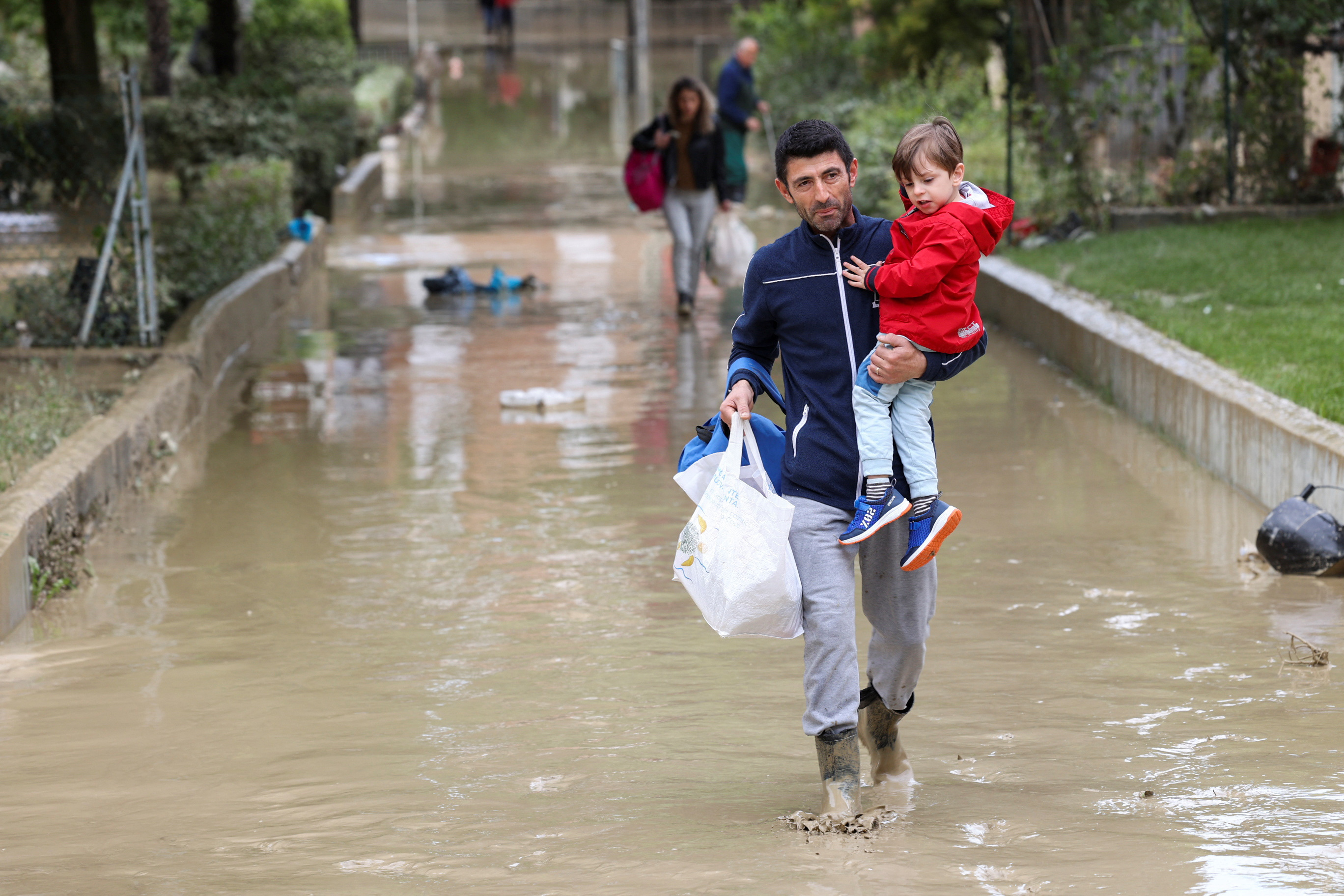 Nine dead in northern Italy floods, Formula One race called off | Reuters