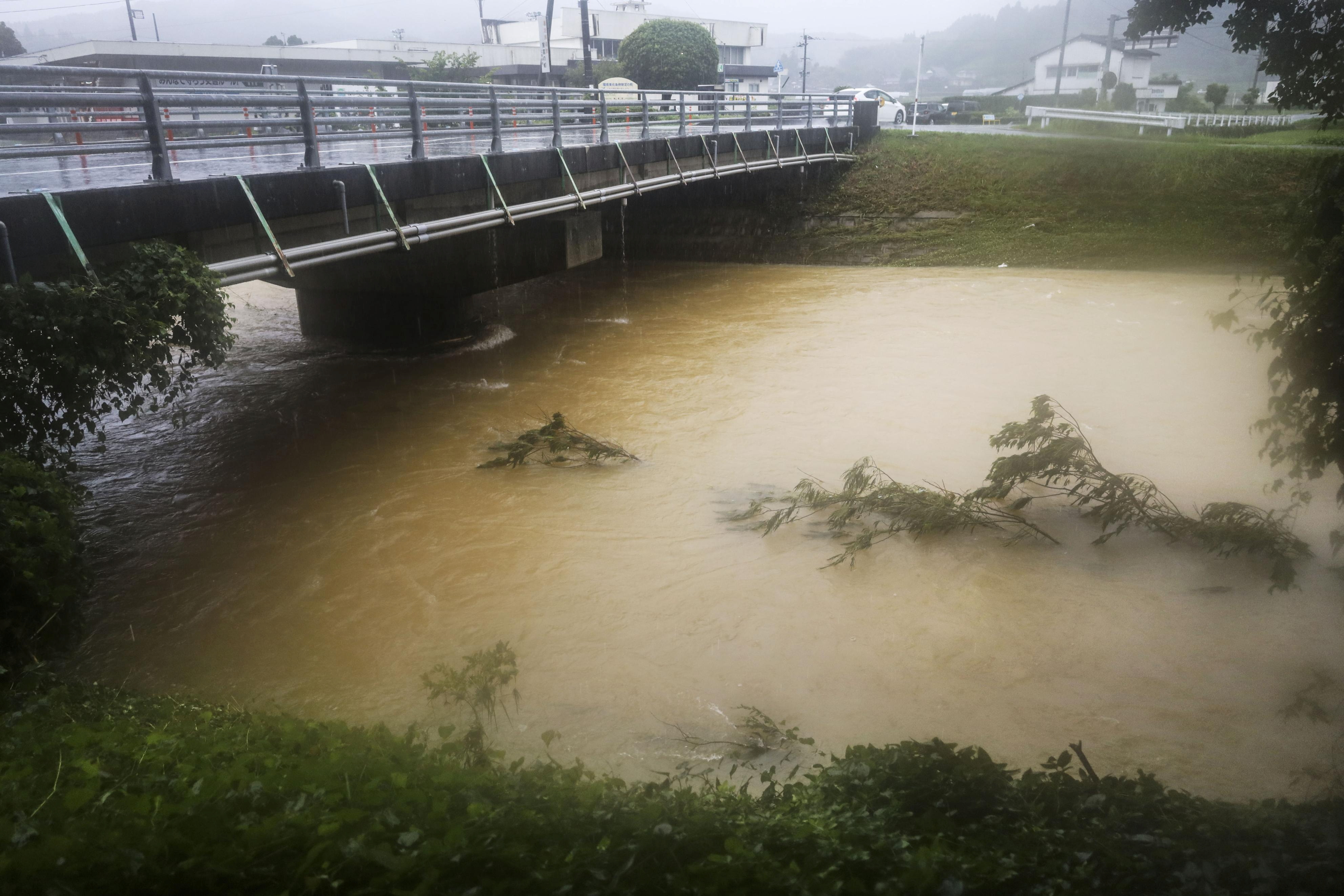 Japan issues highest risk alerts in Hiroshima due to torrential rains ...