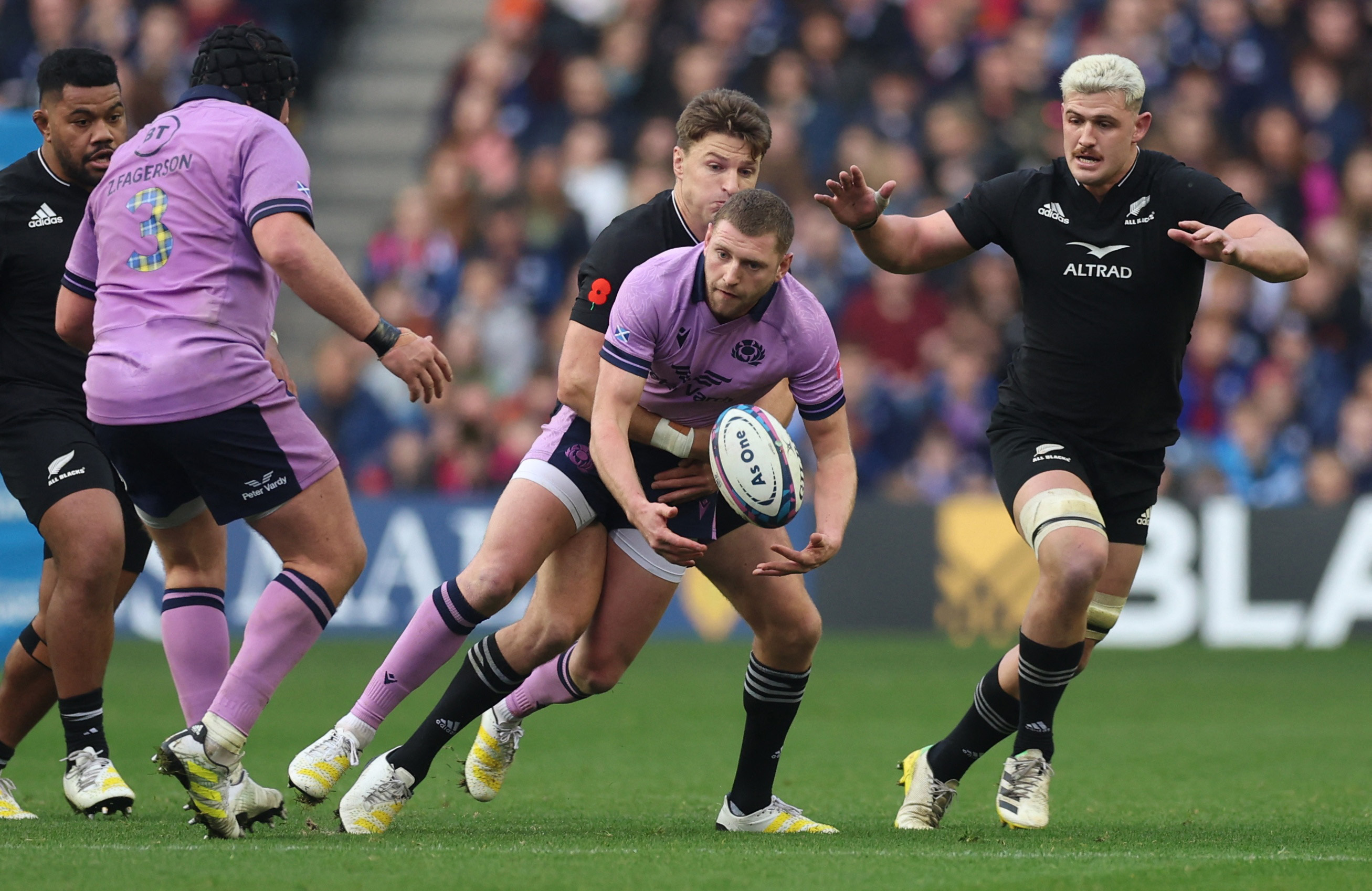 Telea double sees All Blacks hold off feisty Scotland challenge | Reuters