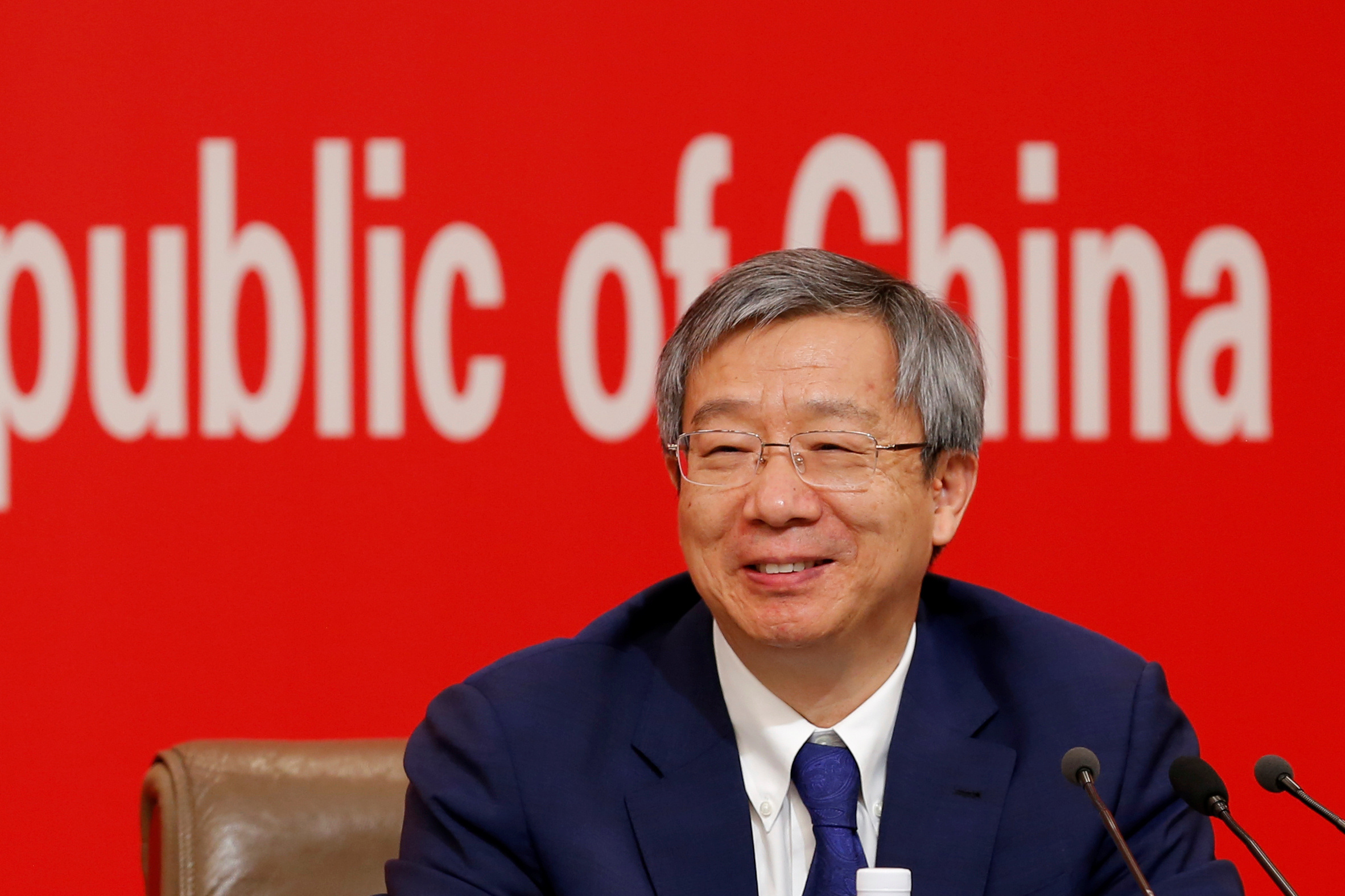 China will step up international macro policy communication - c.bank governor | Reuters