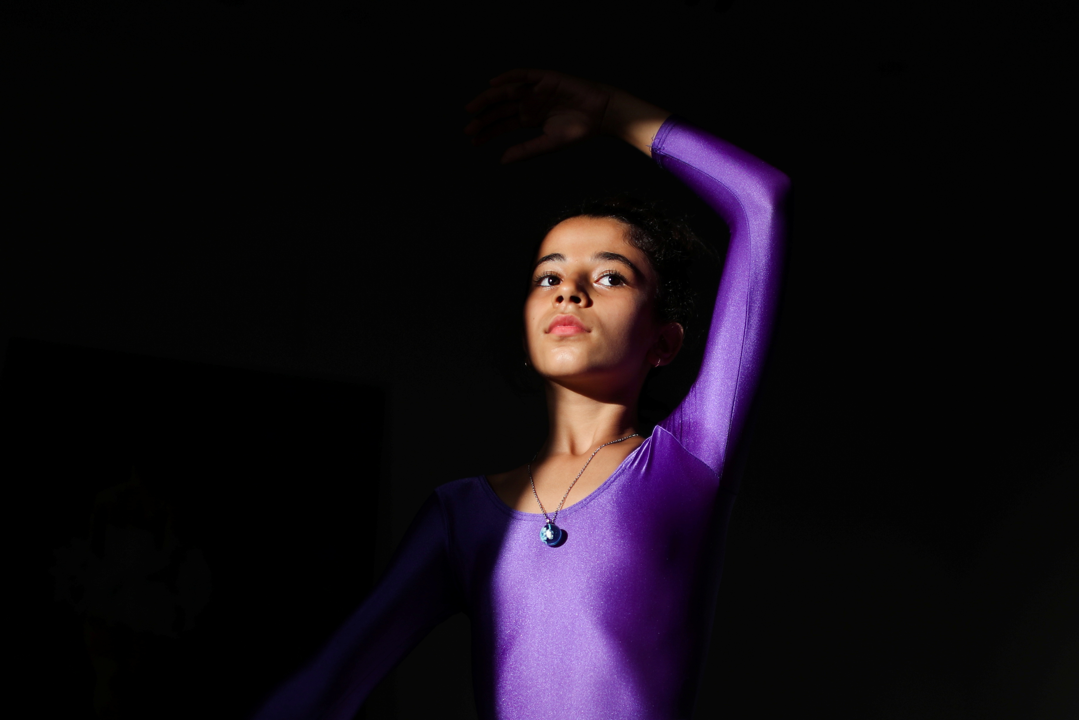 Gaza artist mixes beauty with pain in her ballet paintings | Reuters