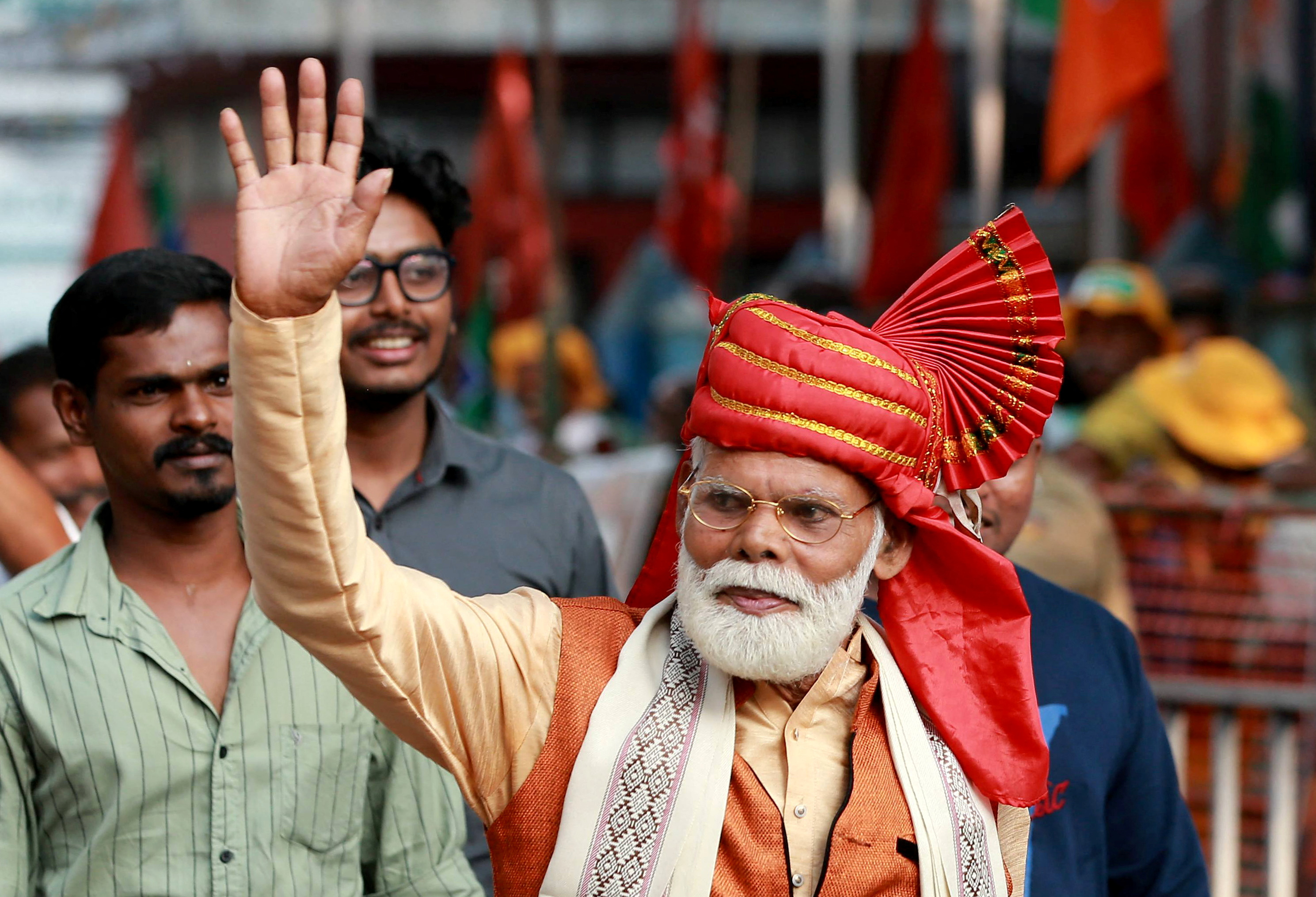 Indian election casts spotlight on Modi look-alikes | Reuters