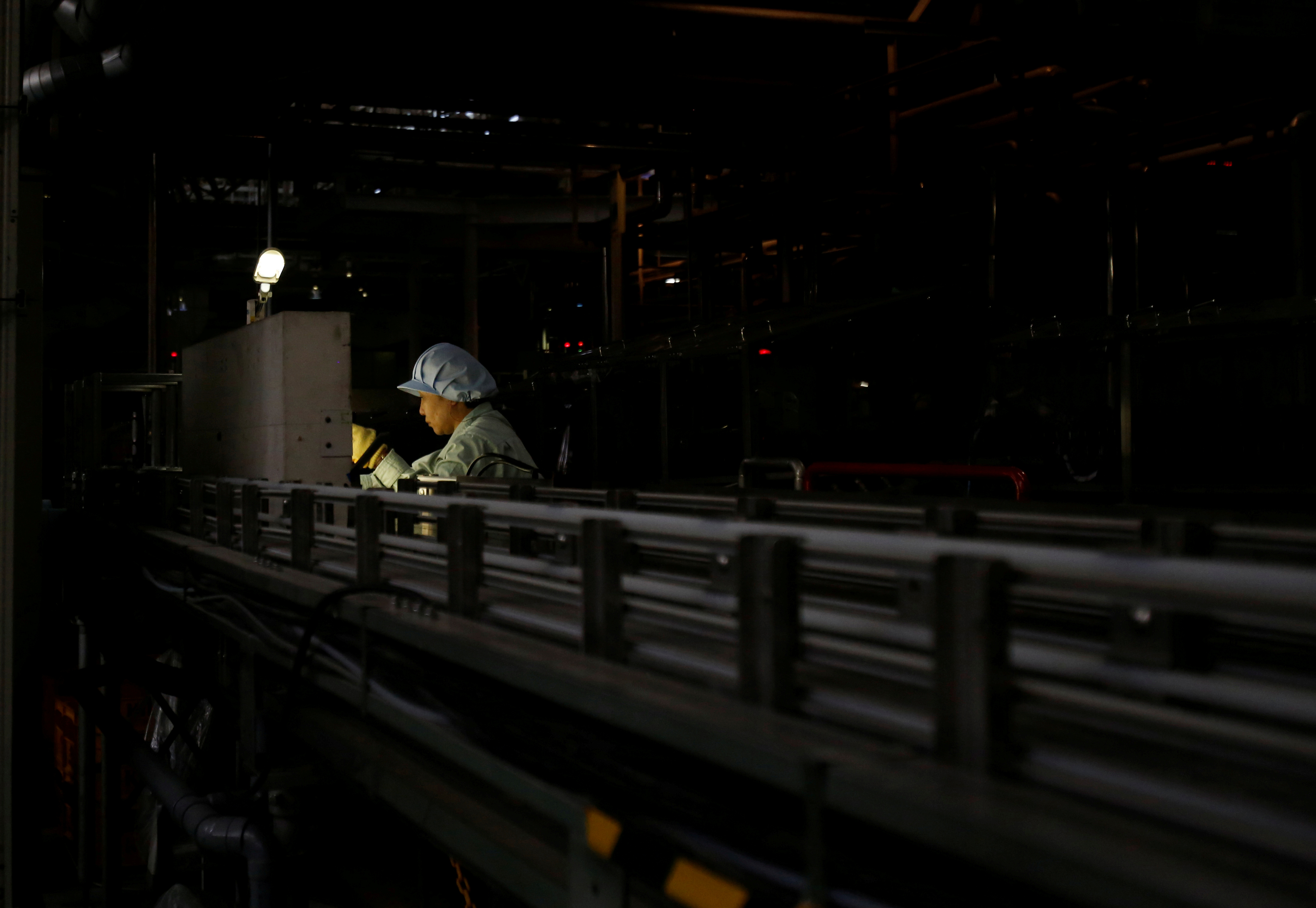 Japan factory activity slips back into contraction in June on soft ...