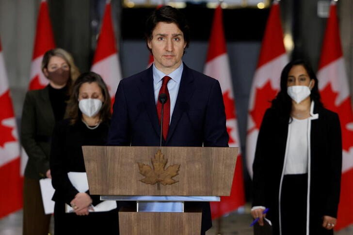 Canada imposes sanctions on Russia's Putin -PM Trudeau | Reuters