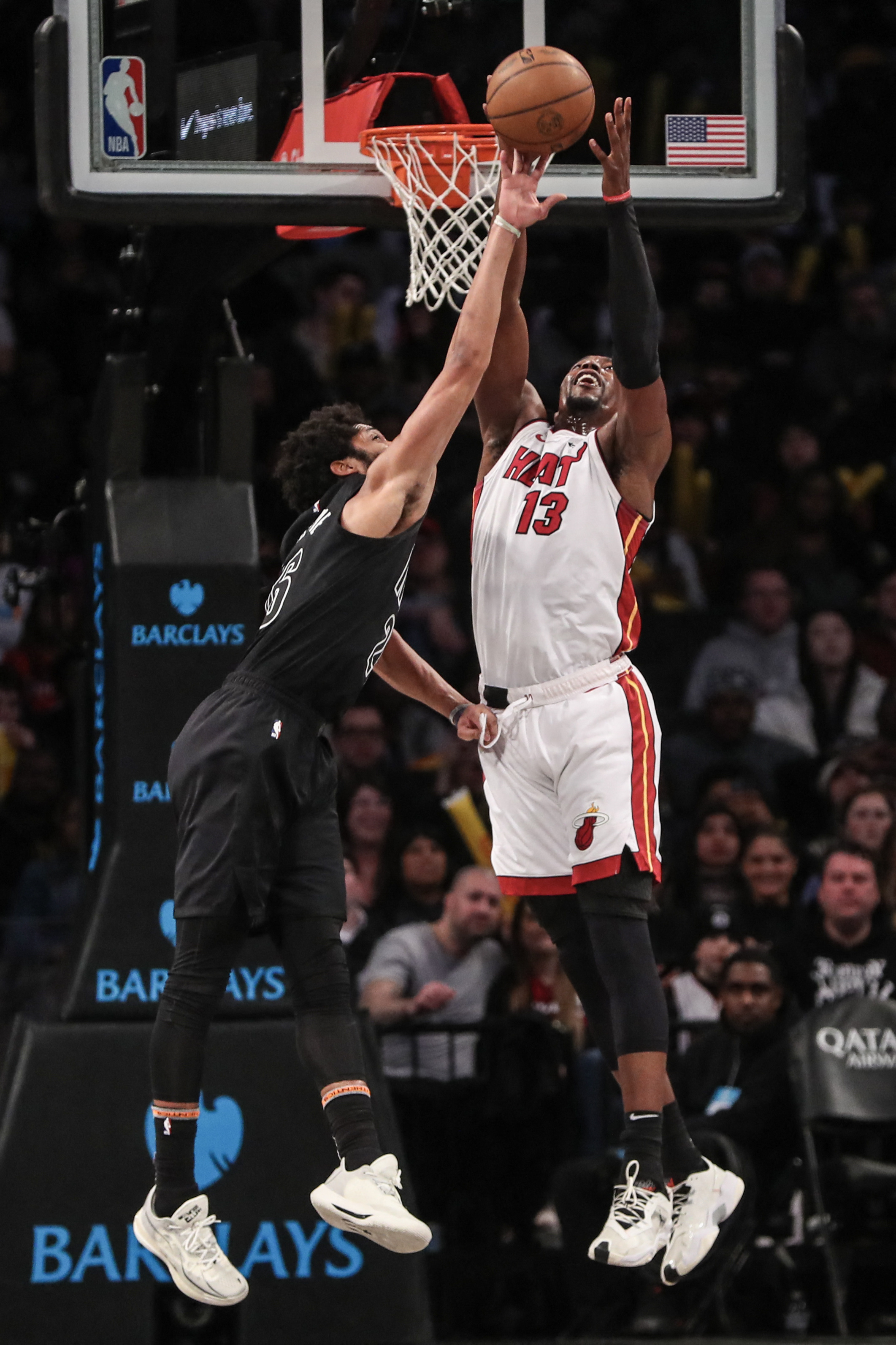 Jimmy Butler returns to guide Heat past Nets in OT | Reuters