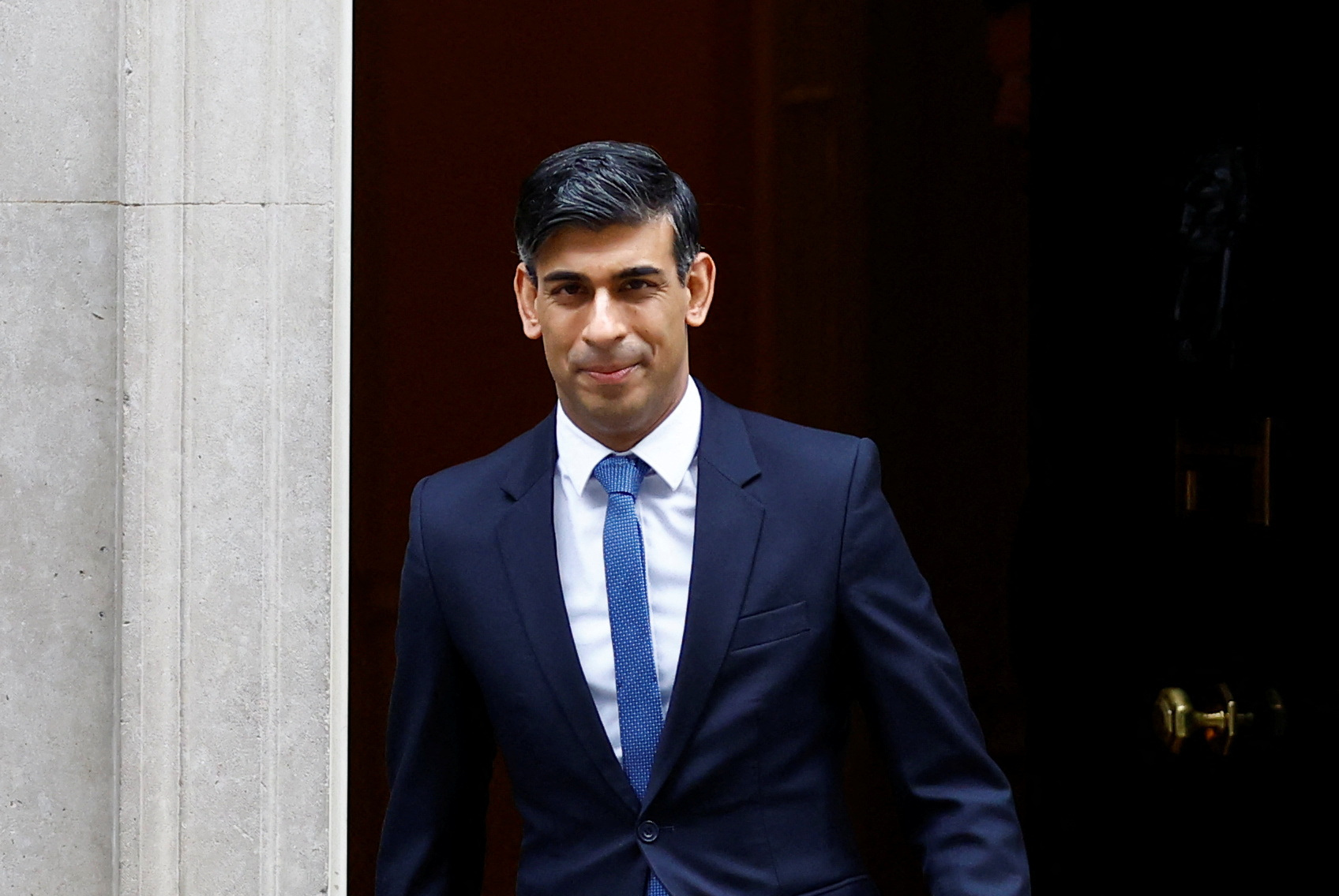 Weakened UK PM Sunak survives Conservative asylum law rebellion | Reuters