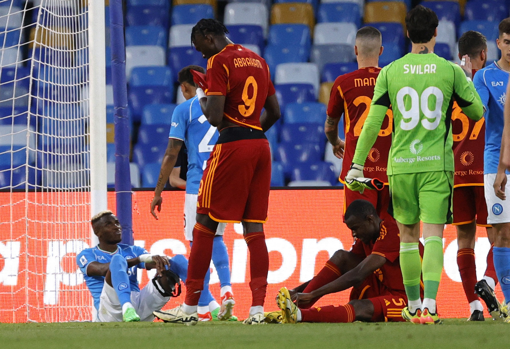 Napoli held to 2-2 draw by Roma after late Abraham header | Reuters