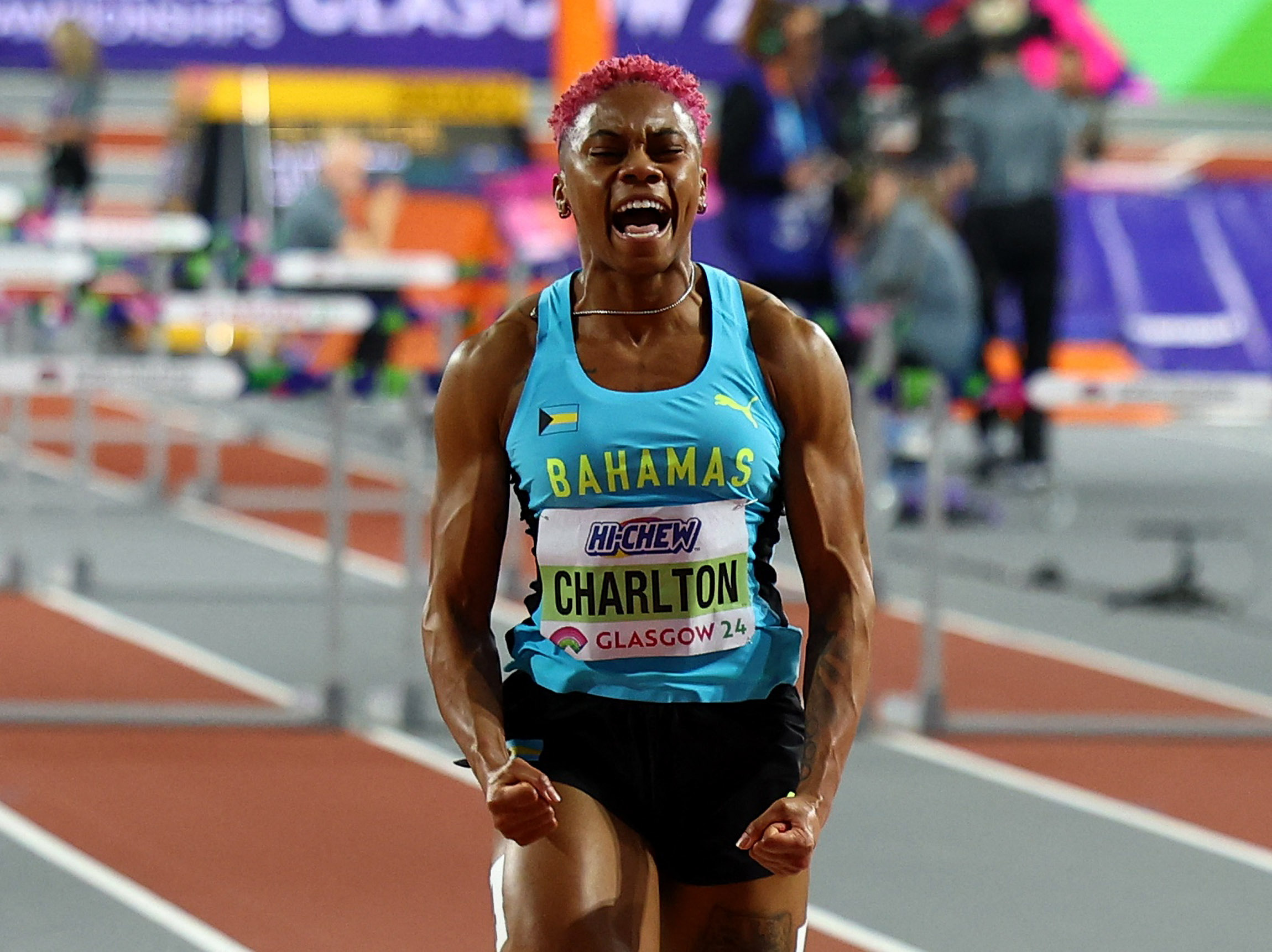 Charlton lowers 60m hurdles world record again at world indoors | Reuters