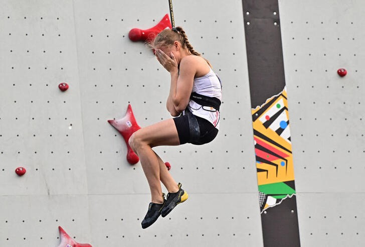 Joy and heartbreak for Polish climber who beat twin to Paris spot | Reuters